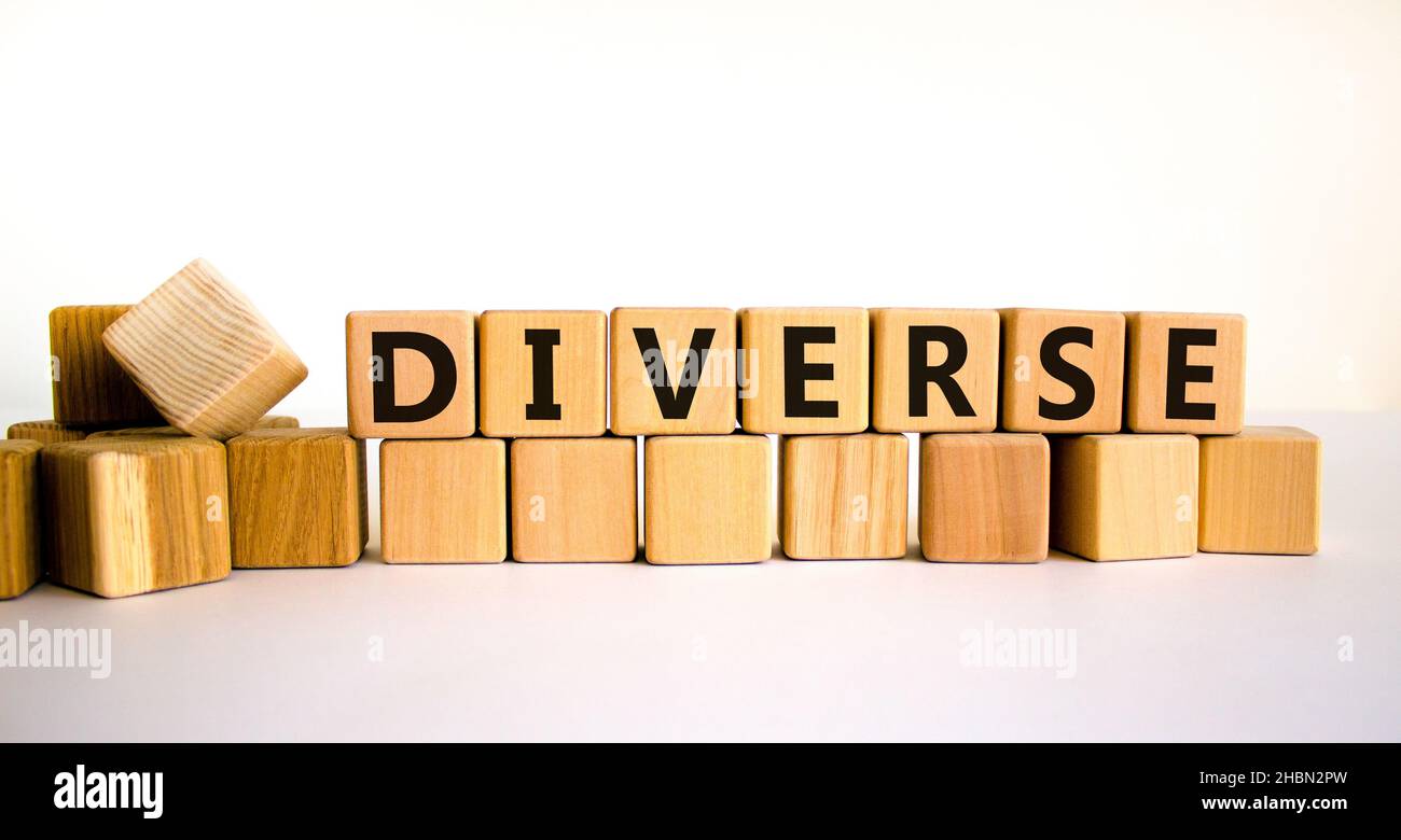 Diverse and diversity symbol. The concept word Diverse on wooden cubes ...