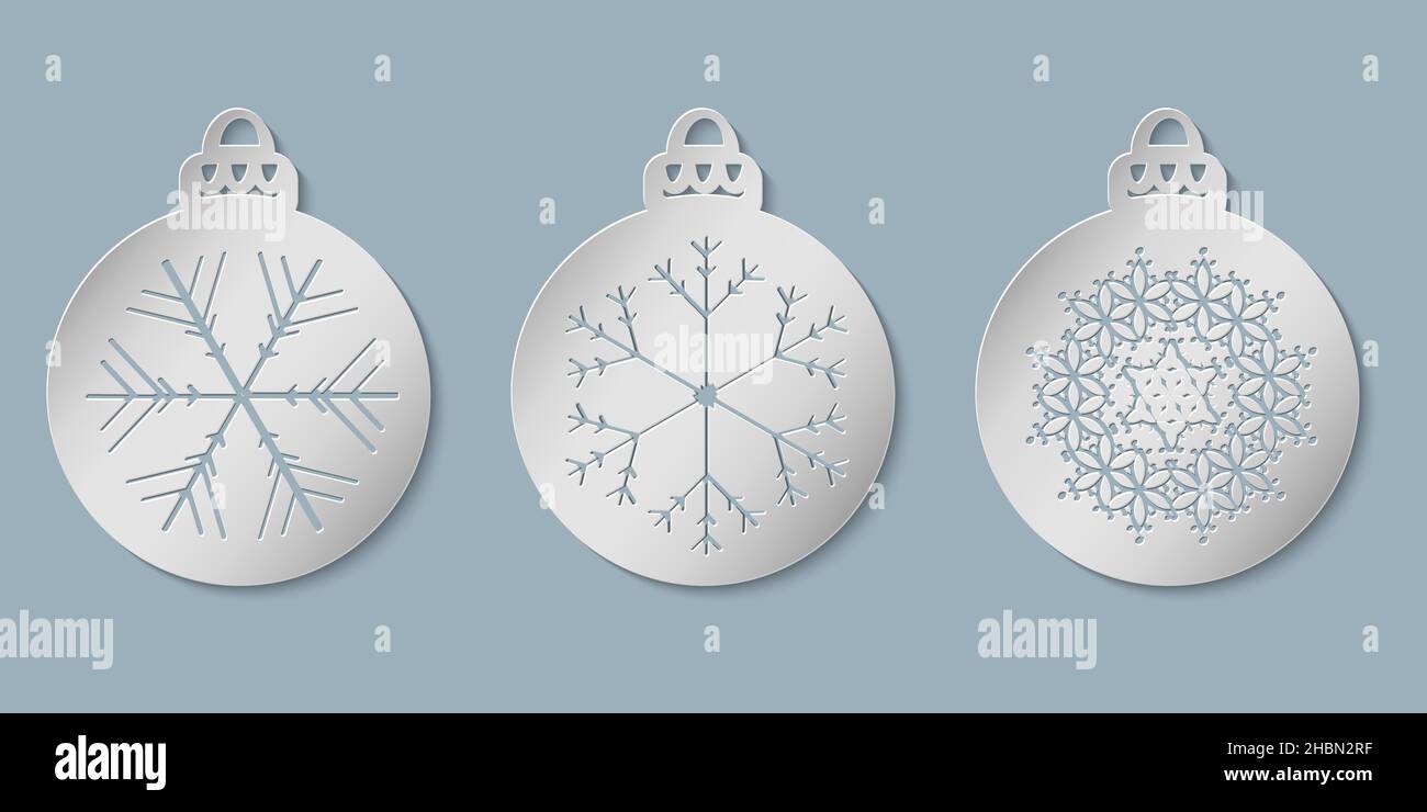 Christmas balls with pattern snowflake cut out of paper. Templates for ...