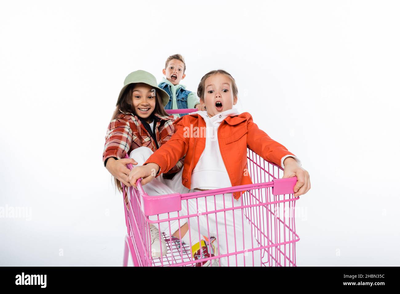 Children riding in shopping cart hi-res stock photography and images ...