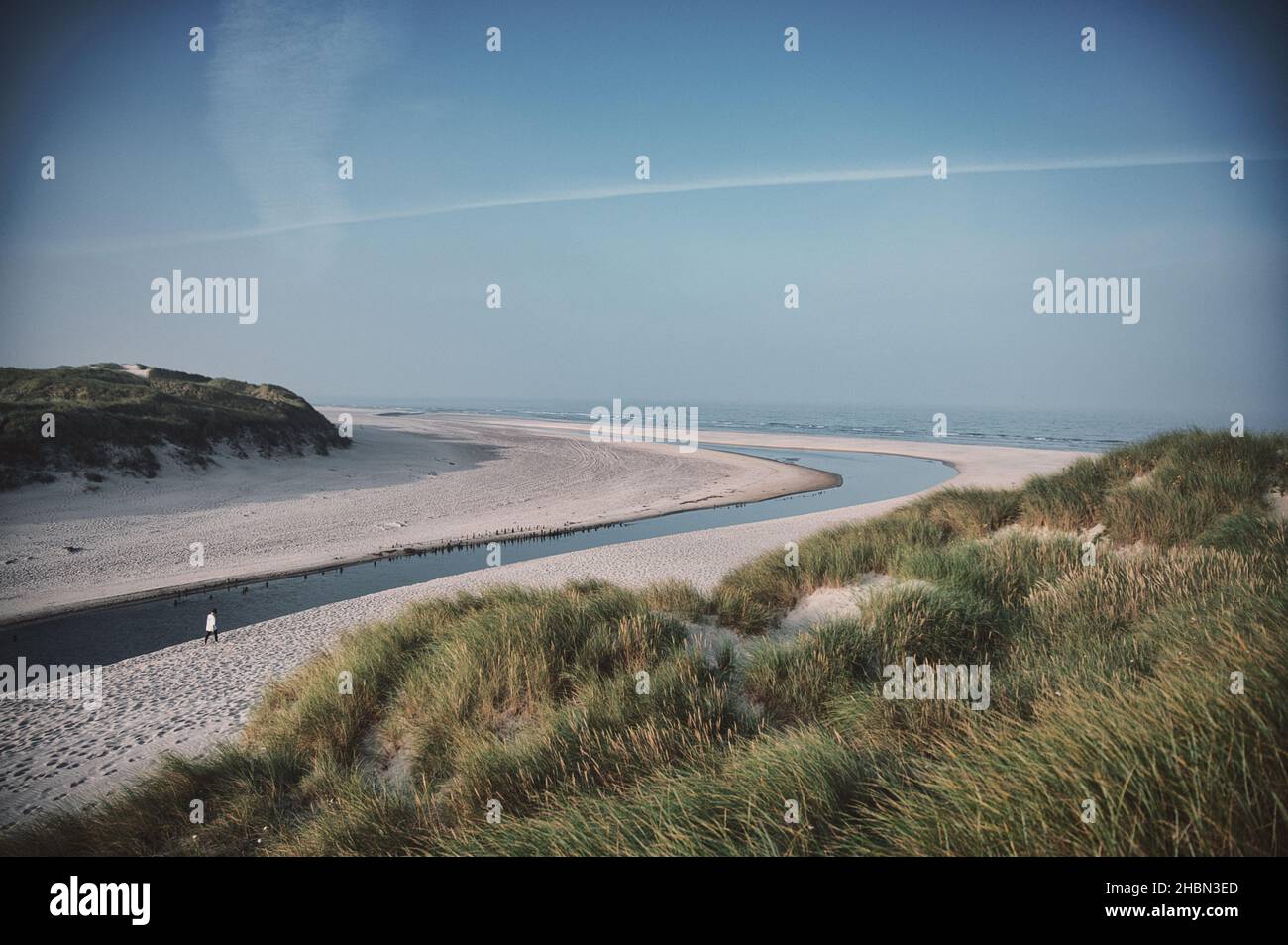 A river on a sandy beach during daylight Stock Photo - Alamy