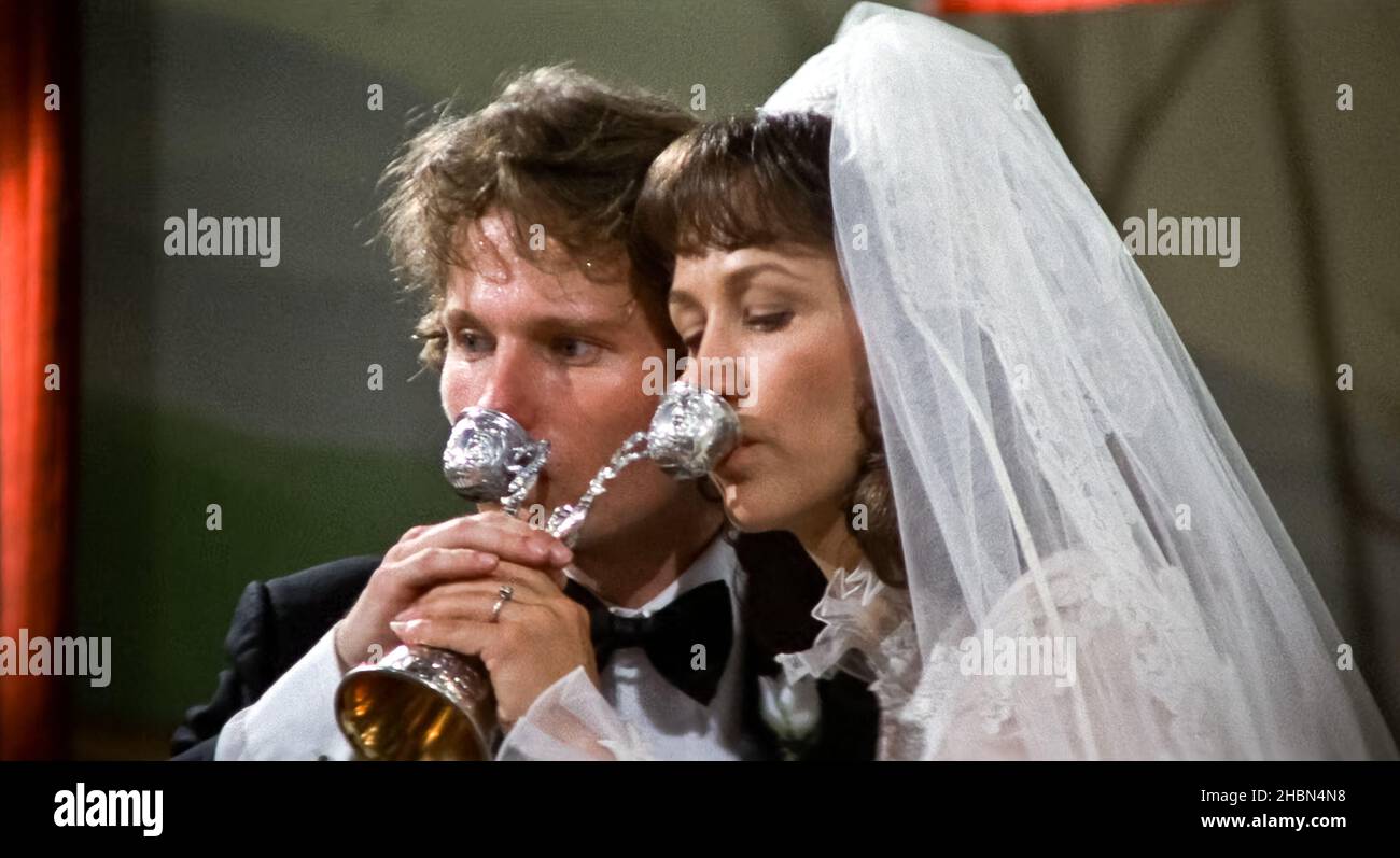 USA. John Savage, Rutanya Alda in a scene from (C)Universal Pictures ...