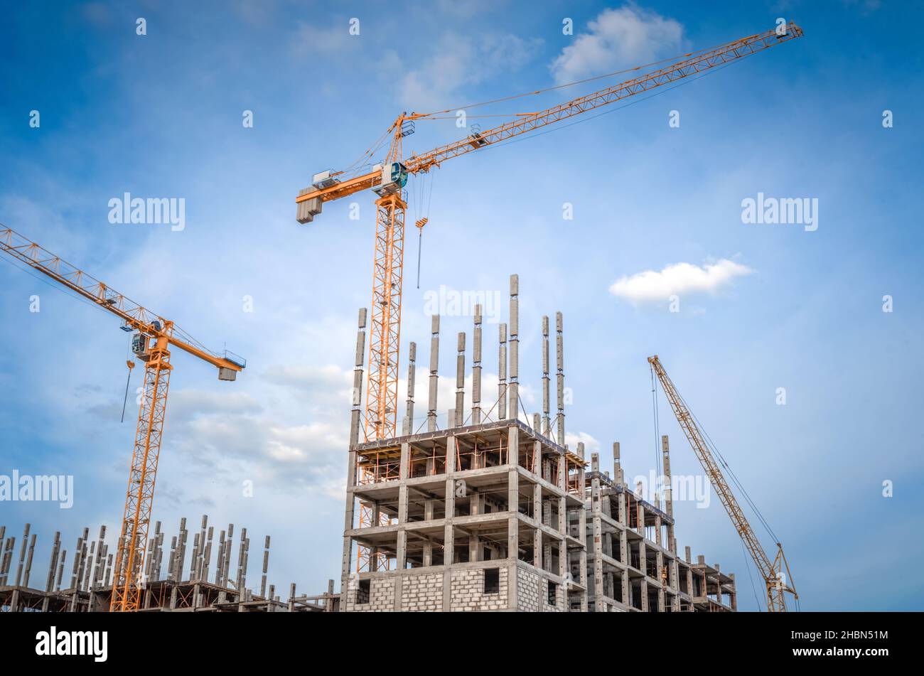 Big cranes building houses hi-res stock photography and images - Alamy