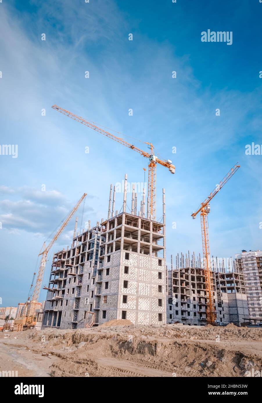 Building of houses and construction machinery Stock Photo - Alamy