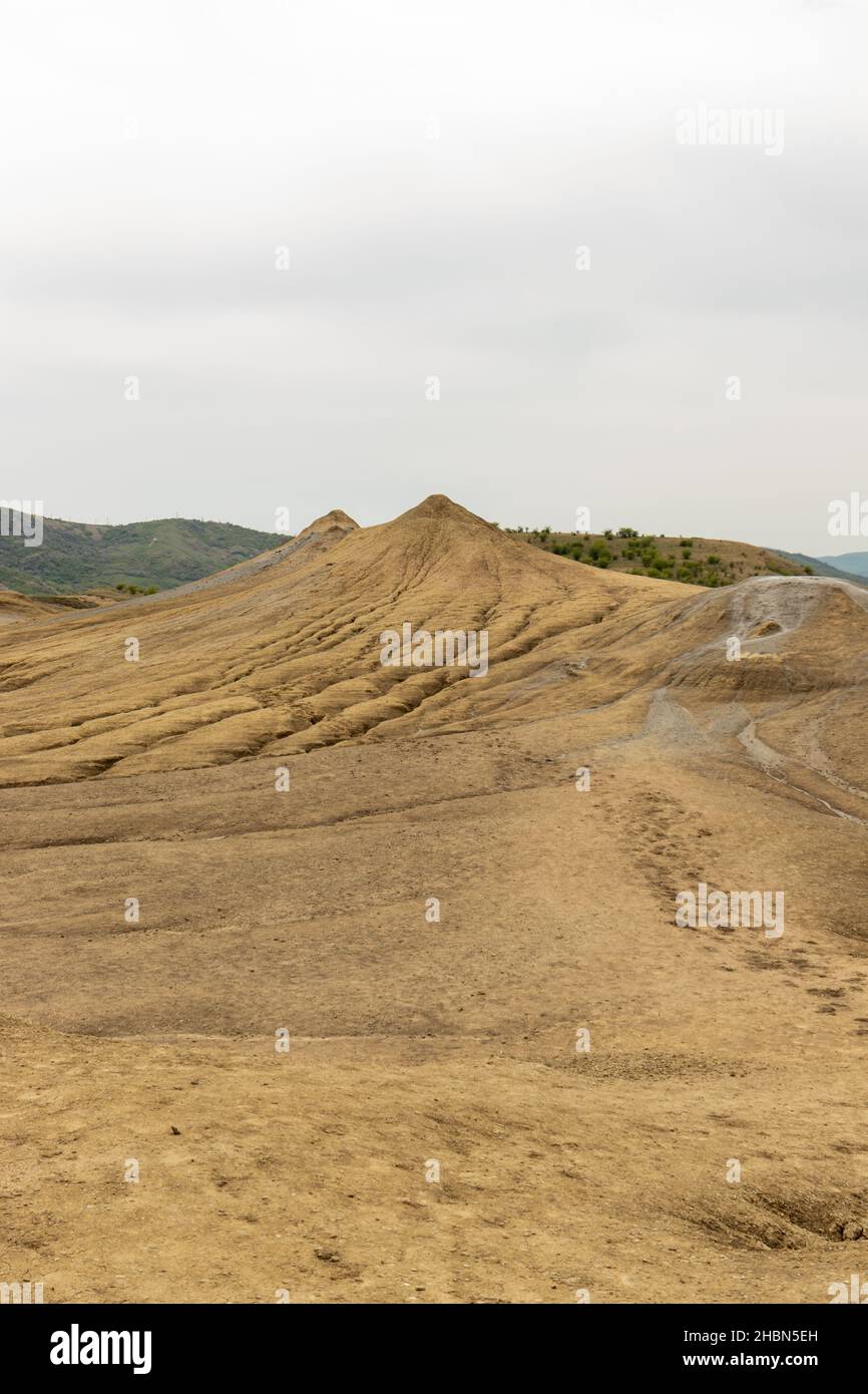 Photo in the area of muddy volcanoes in Buzau, Romania, showing gray ...