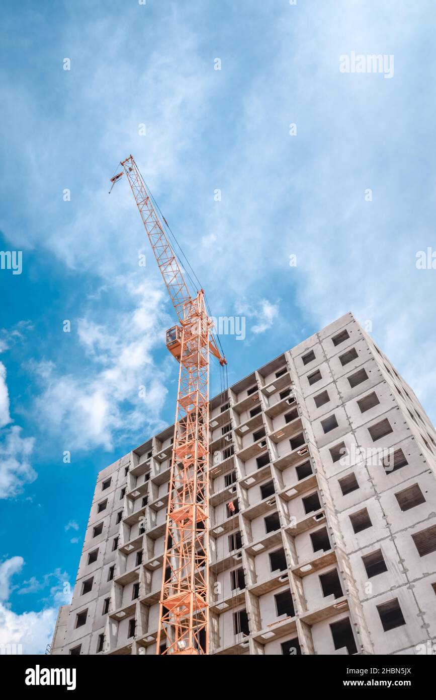 Building of new apartments and crane Stock Photo - Alamy