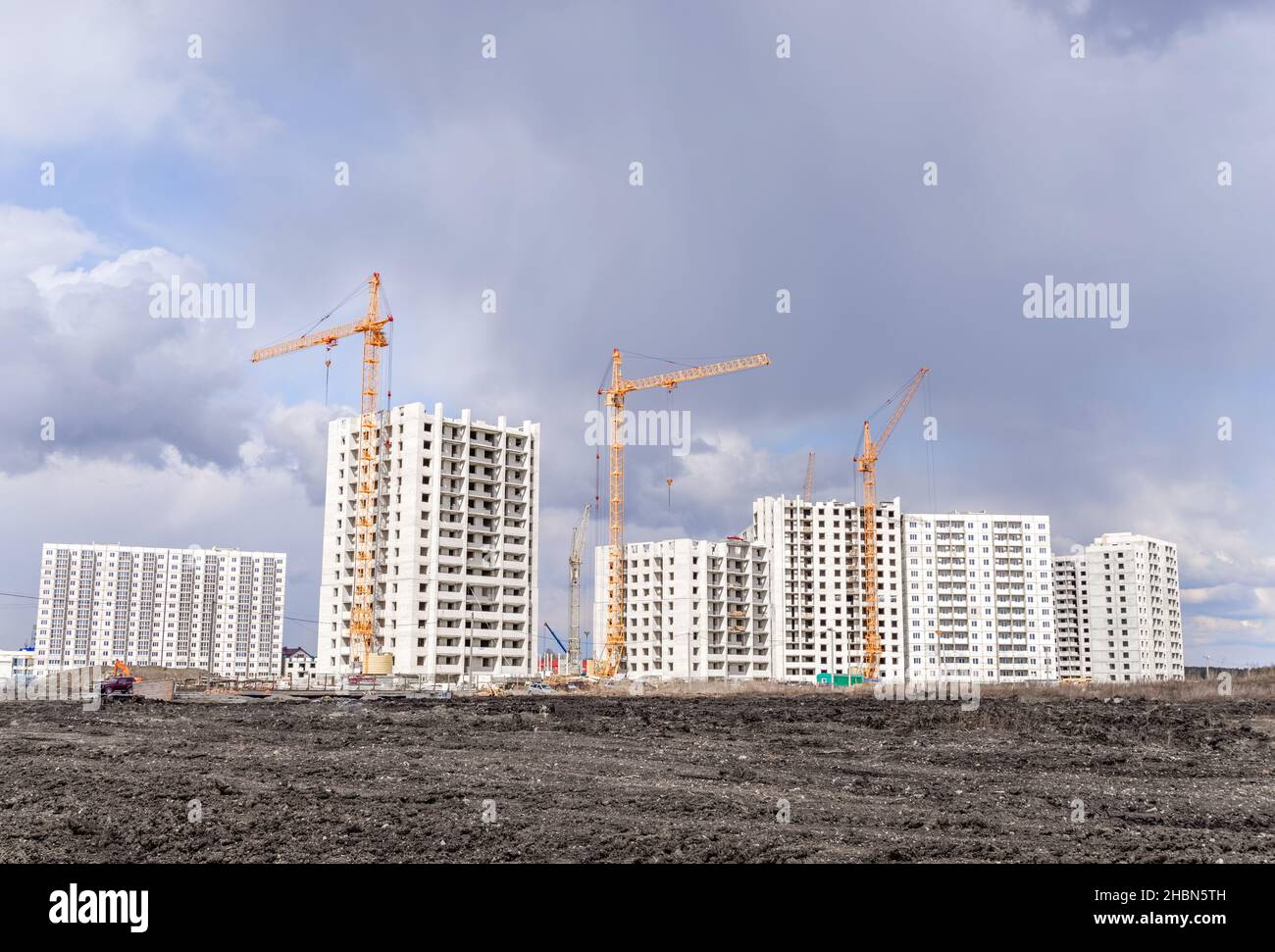 Crane and new apartments Stock Photo - Alamy