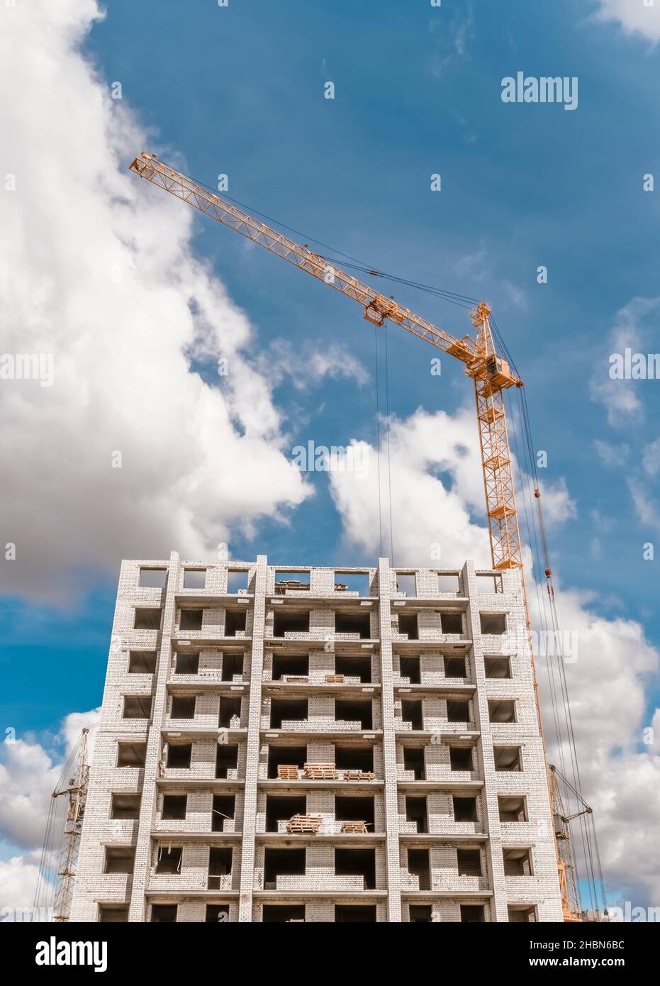 Construction of multistorey building and hoisting tower cranes Stock ...