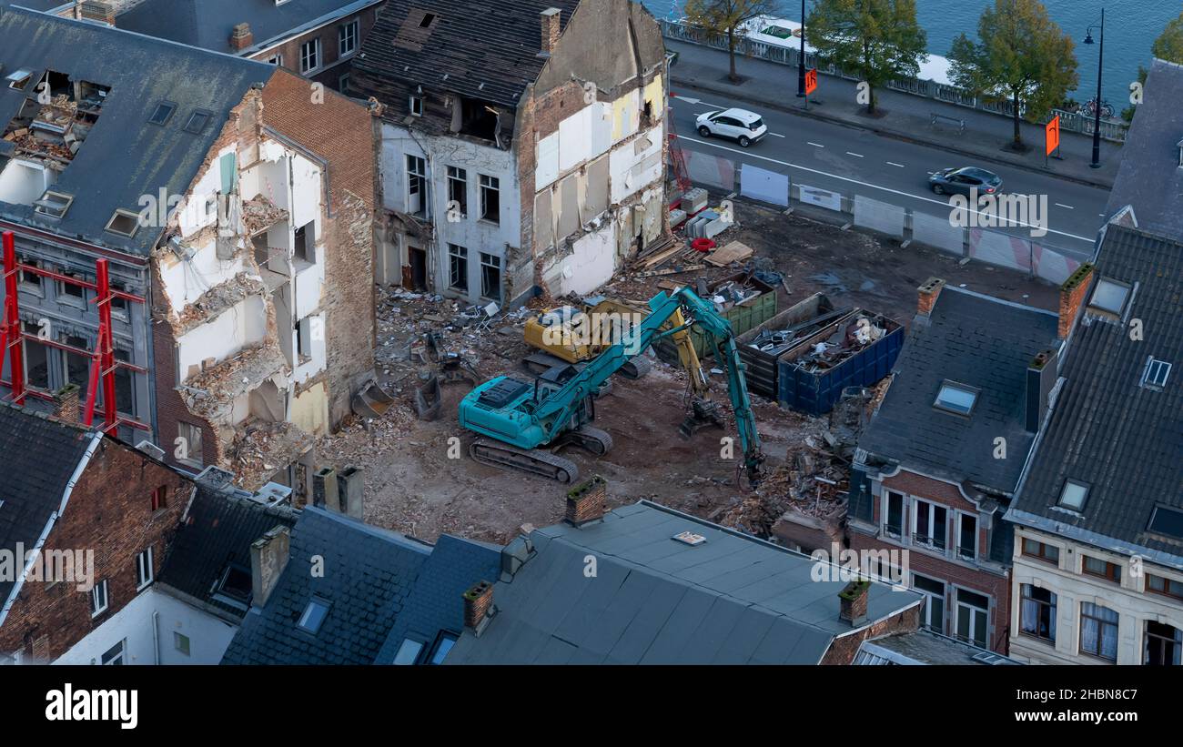 View of demolished old buildings with construction equipment Stock ...