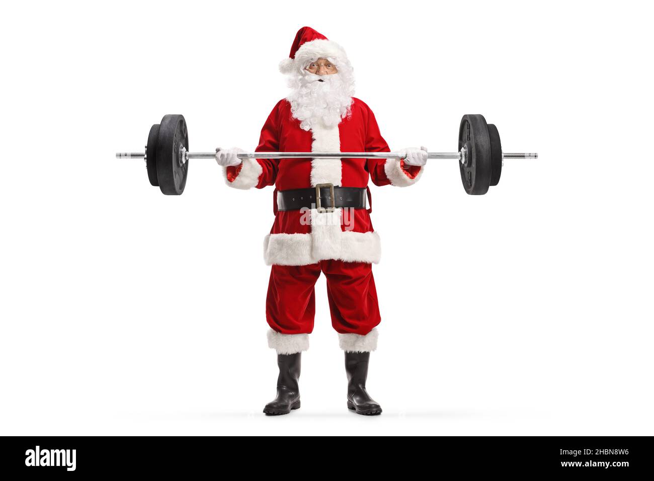 Full length portrait of santa claus lifting weights isolated on white ...