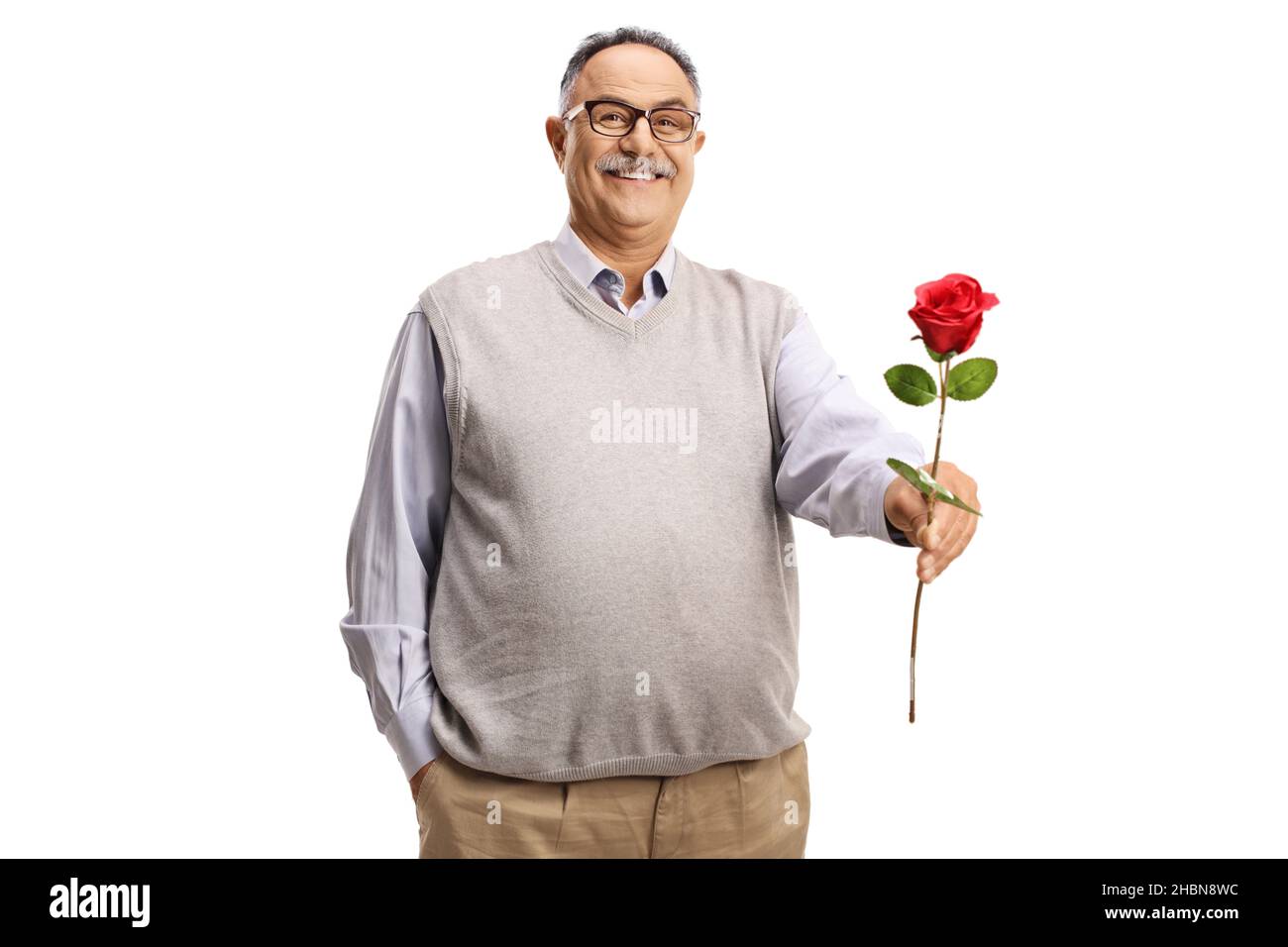 Smiling mature man holding a single red rose isolated on white ...