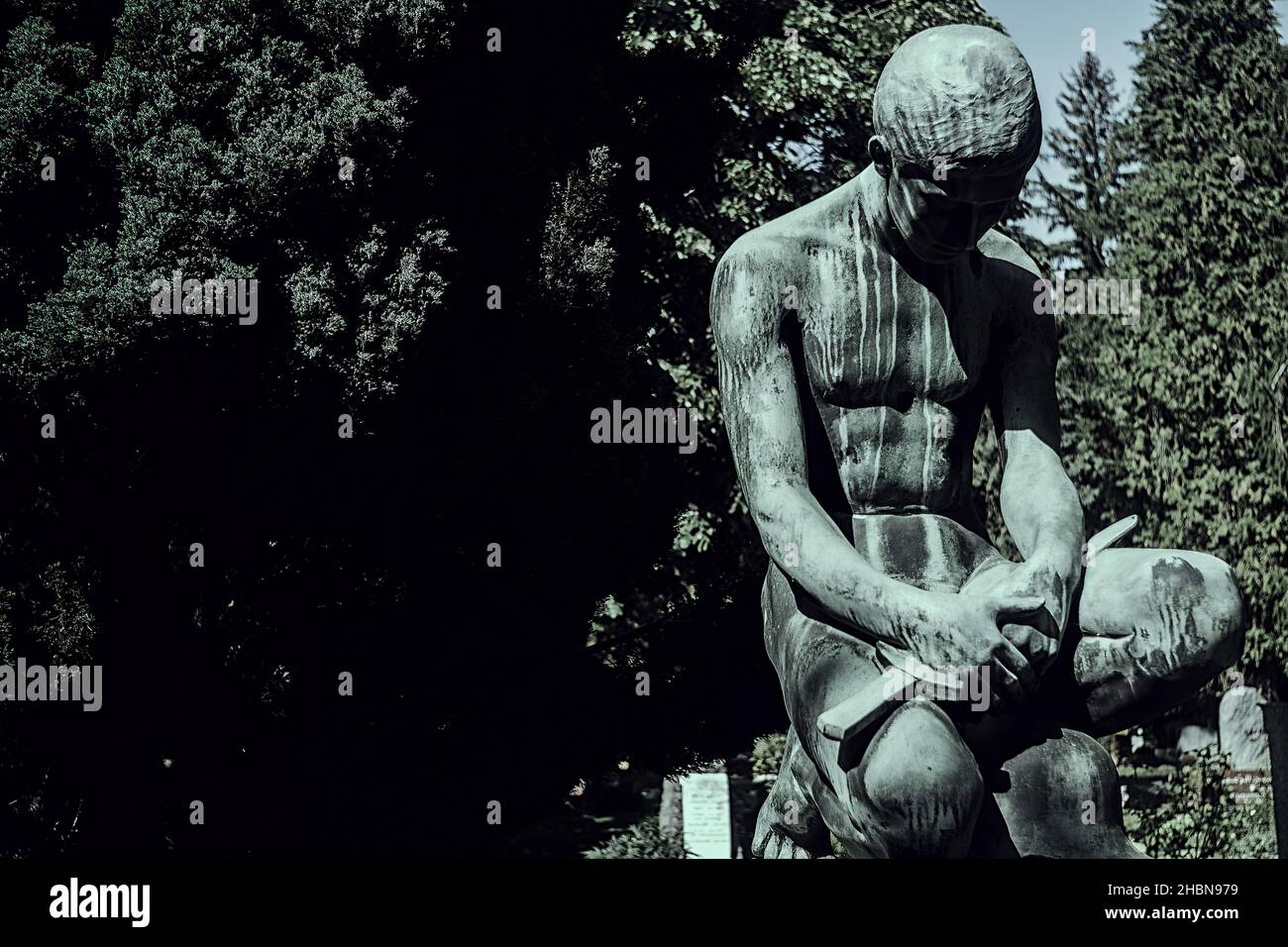 Kneeling Man Statue