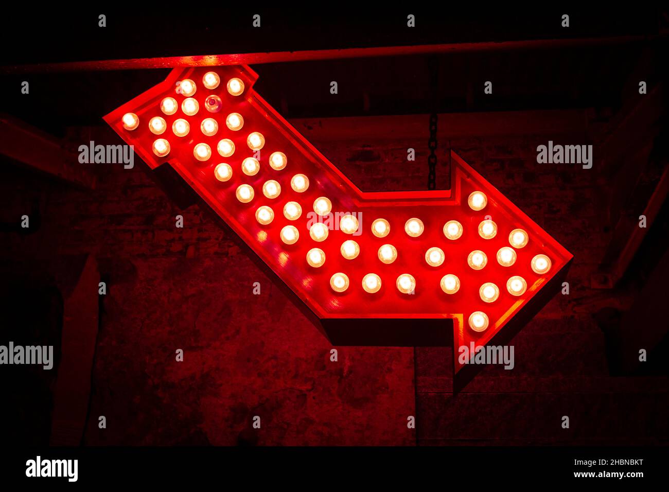 red arrow illuminated with bulbs in Chelsea market Stock Photo - Alamy