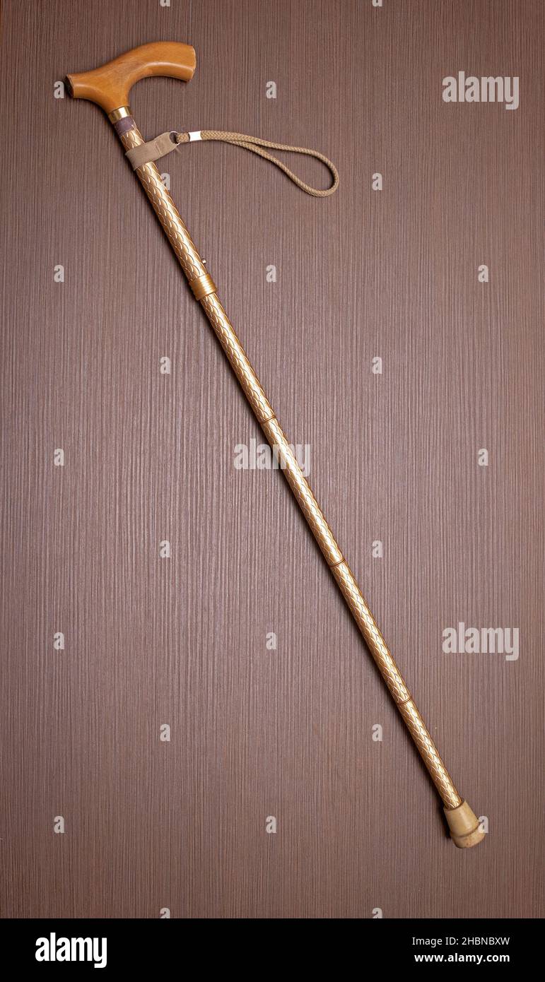 Metal gold foldable walking aid stick support tool Stock Photo - Alamy