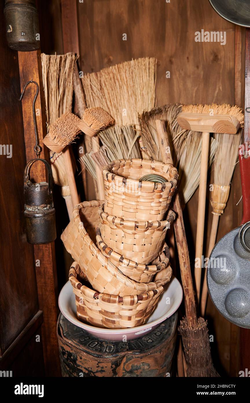 Wicker baskets and rustic wood and wicker brooms typical of the Basque ...