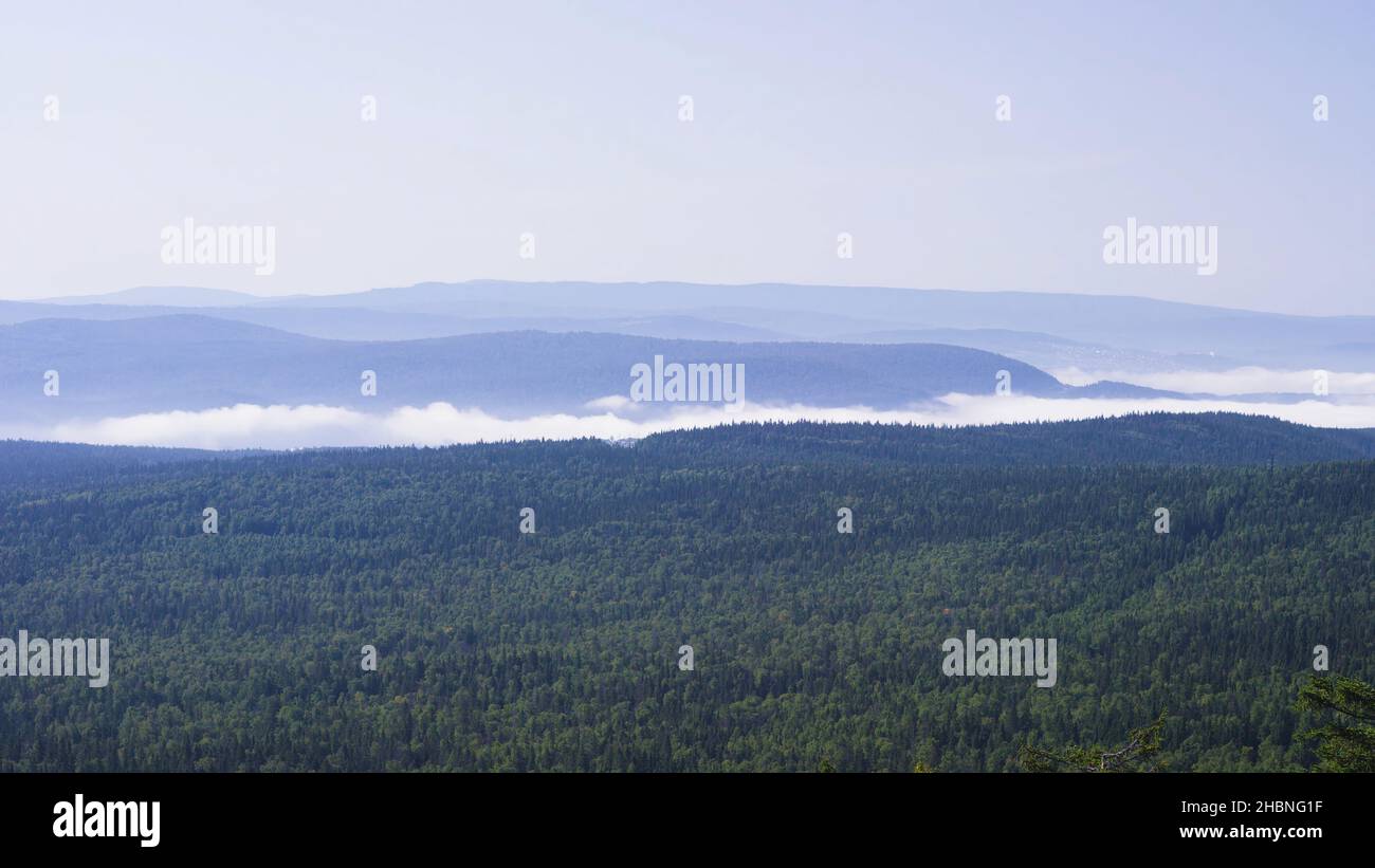 Sunny fog surrounds the mountains hi-res stock photography and images ...