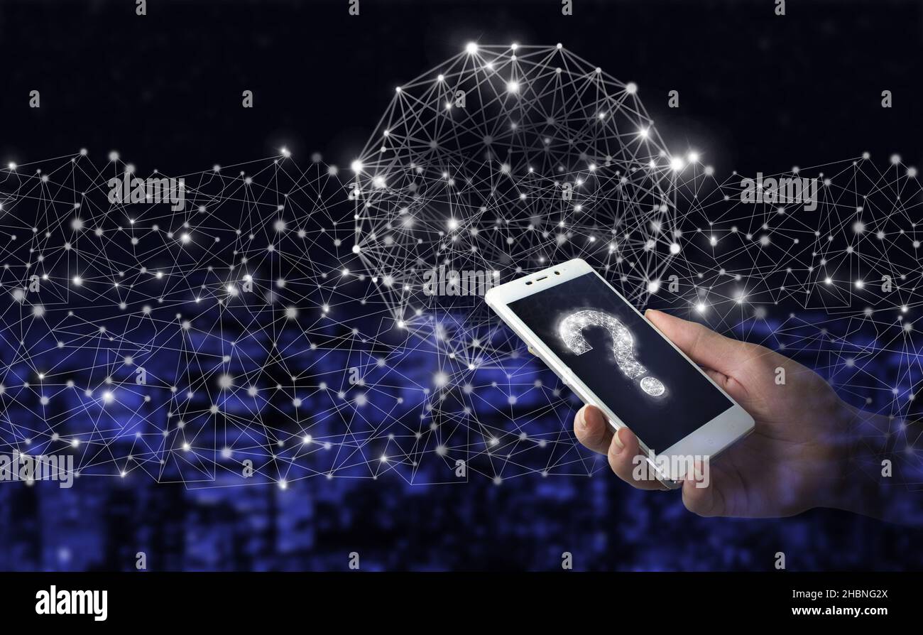 FAQ Concept image.Find answer online. Hand hold white smartphone with ...