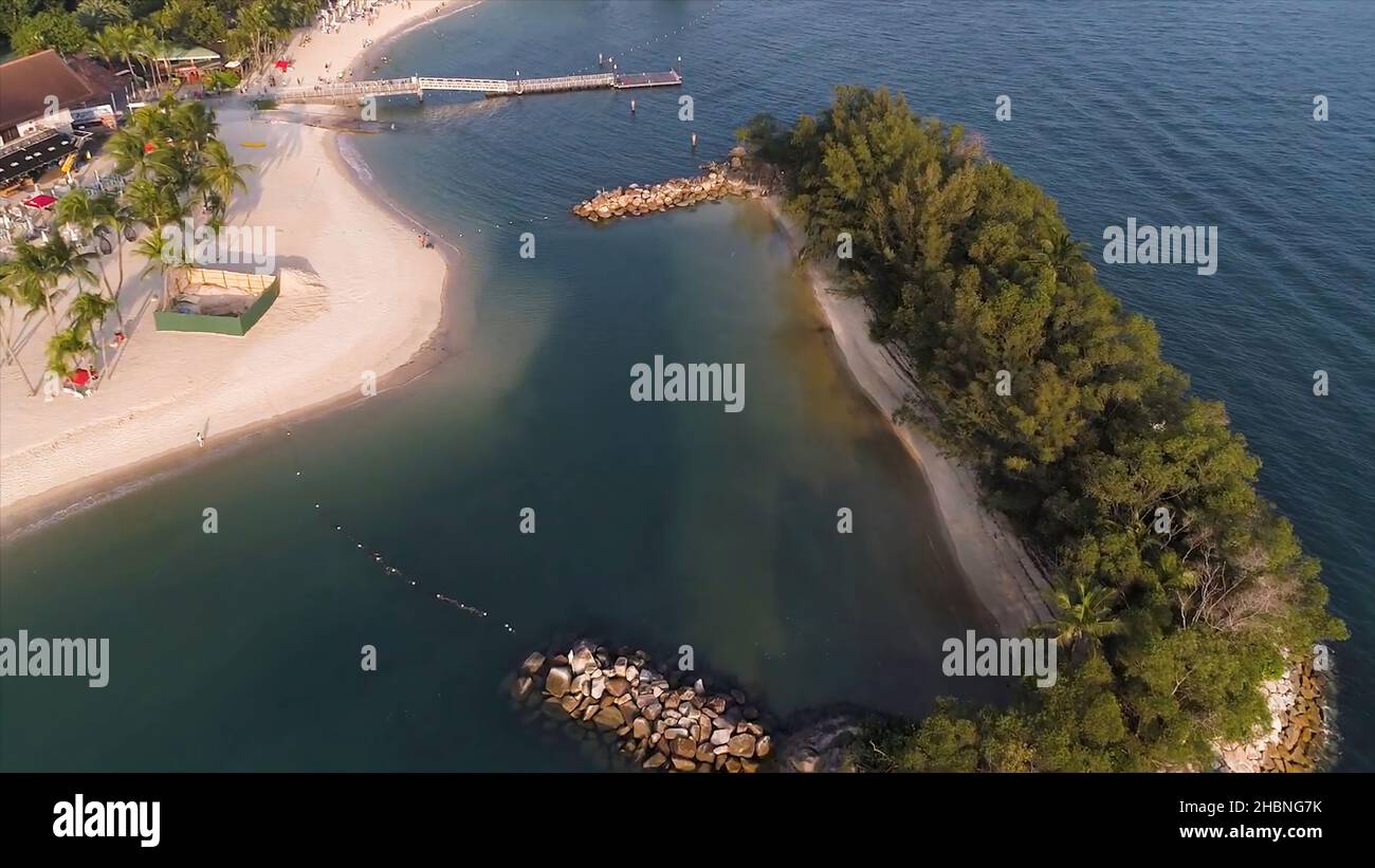 Aerial view of lagoon with blue, azure water in the middle of small ...
