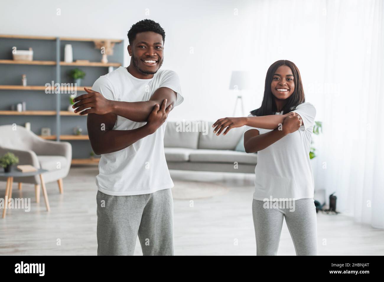 Man stretch exercise home hi-res stock photography and images - Alamy