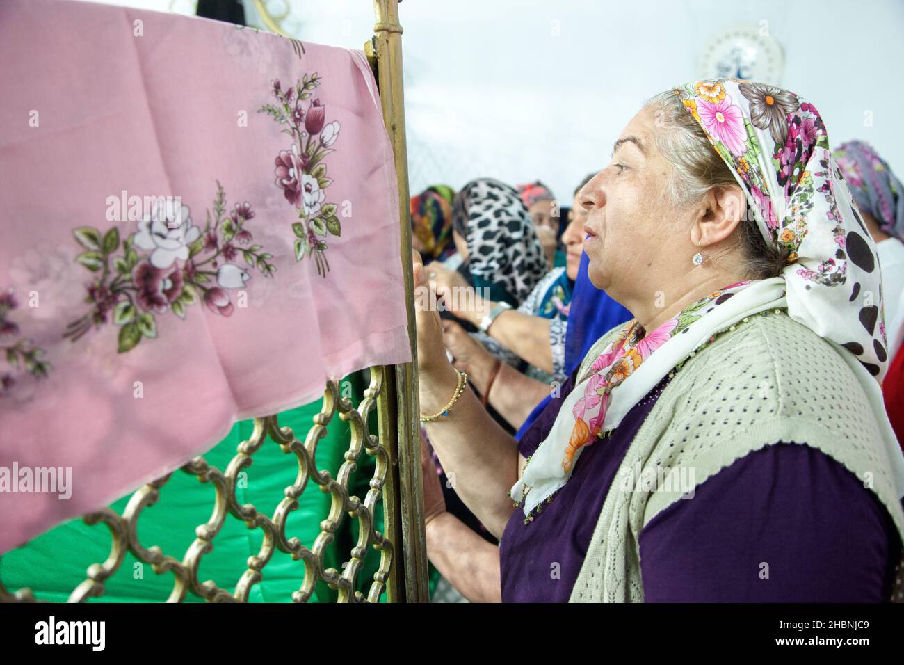 Antalya,Turkey - 06-25-2016:Alevi women praying at the tomb of Abdal ...