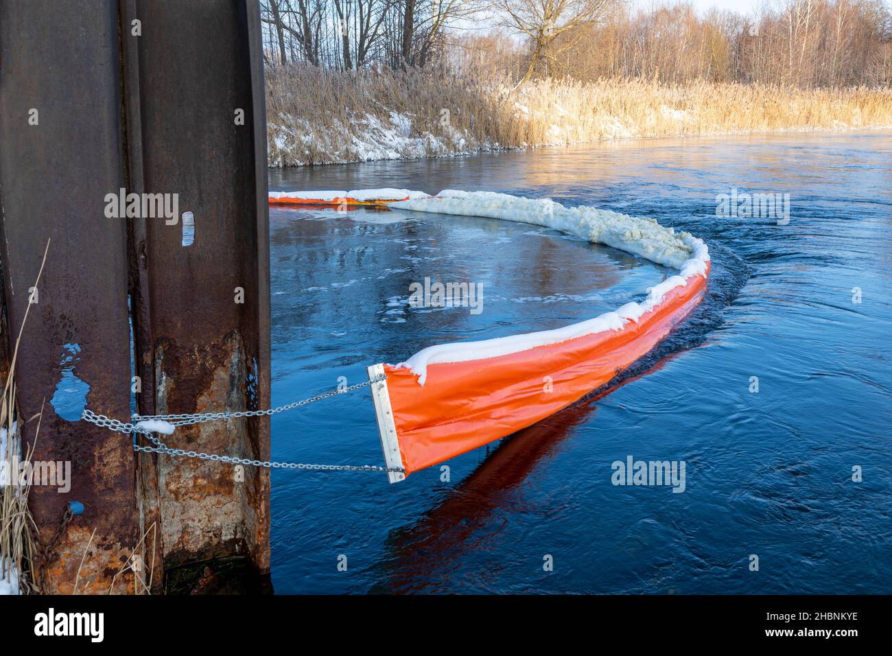 The floating boom prevents foam and debris from contaminating the ...