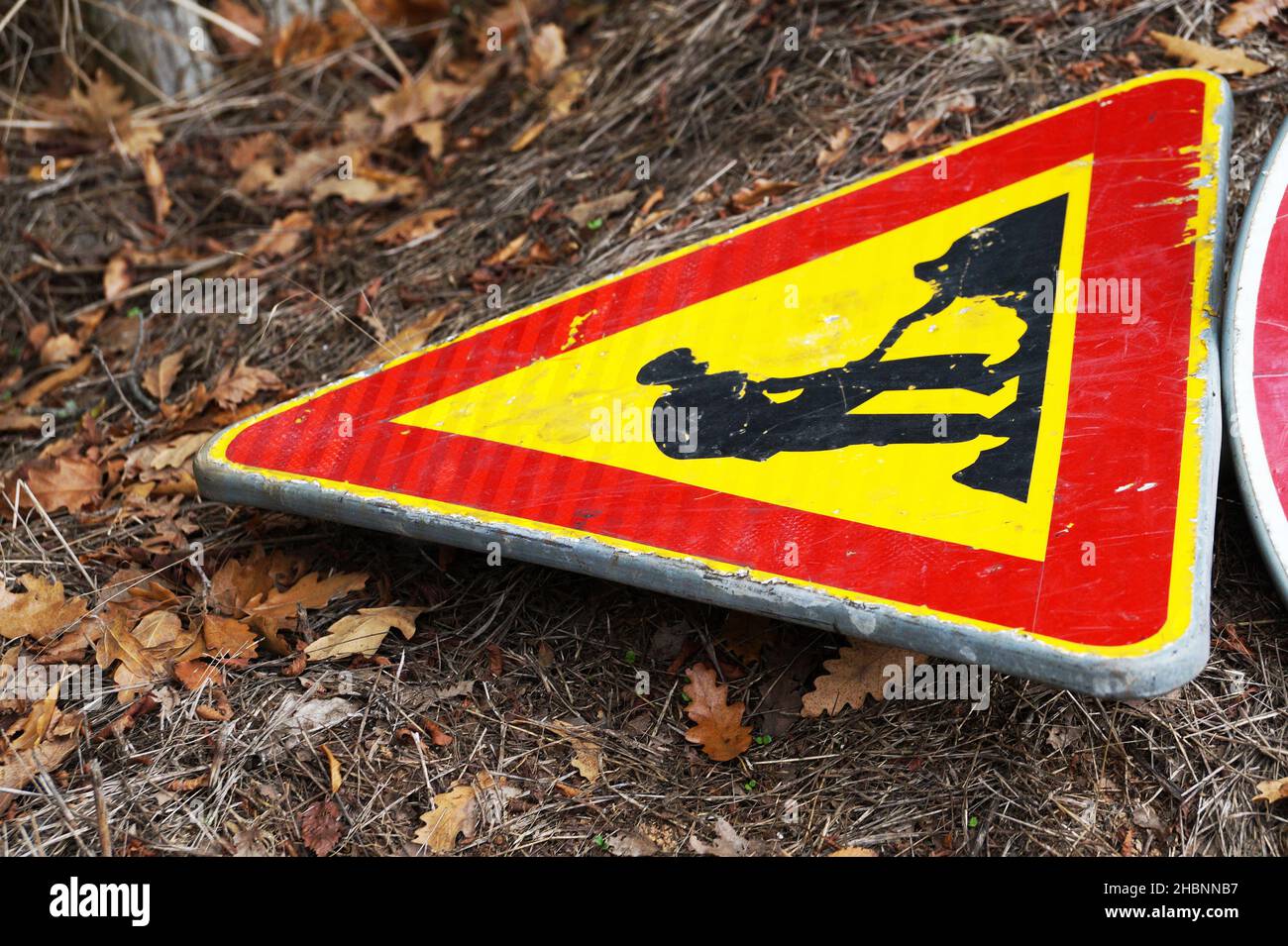 road sign earthworks lying on the ground close-up Stock Photo - Alamy