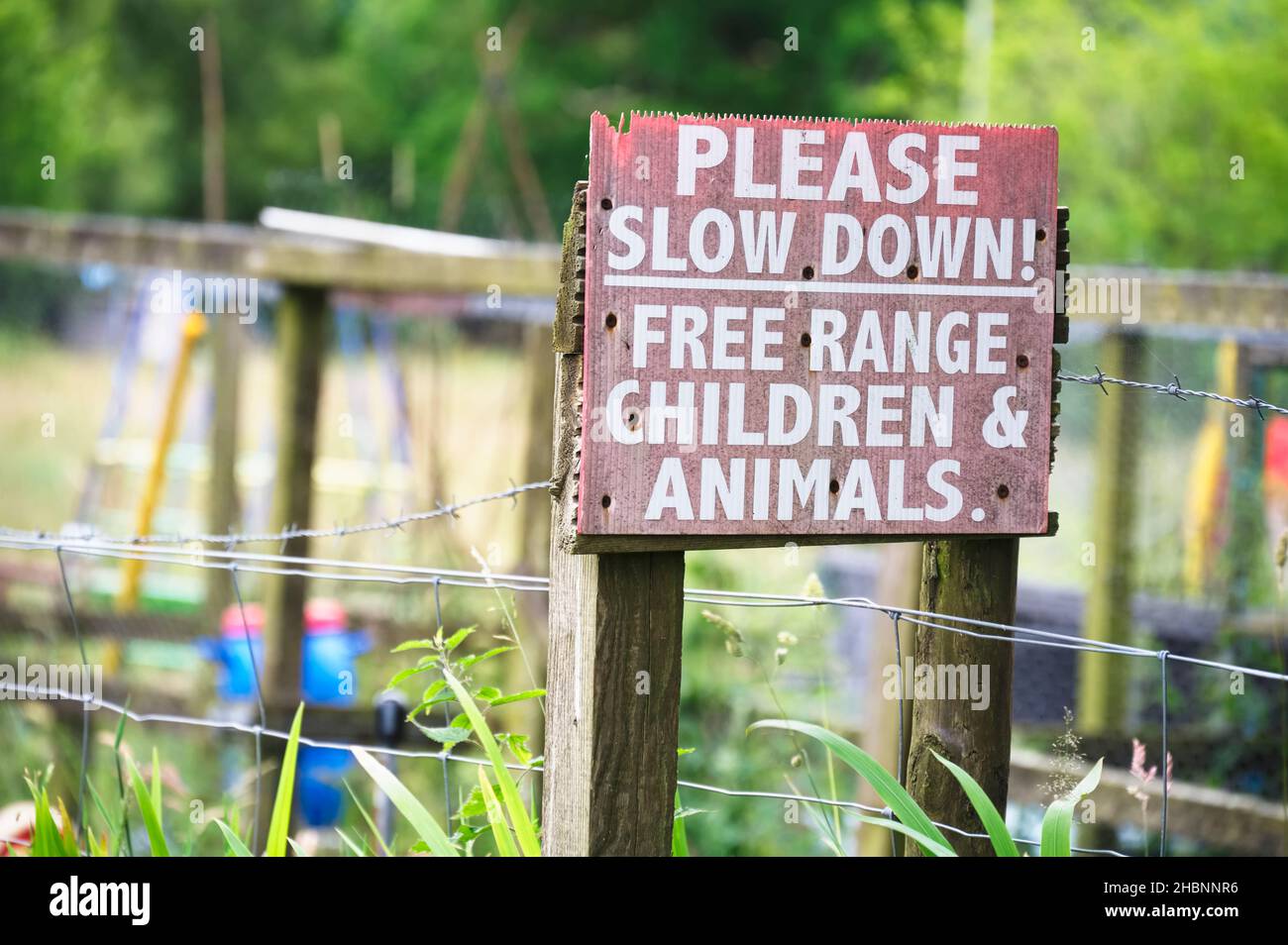 Beware children and animals safety sign on road for drivers Stock Photo ...
