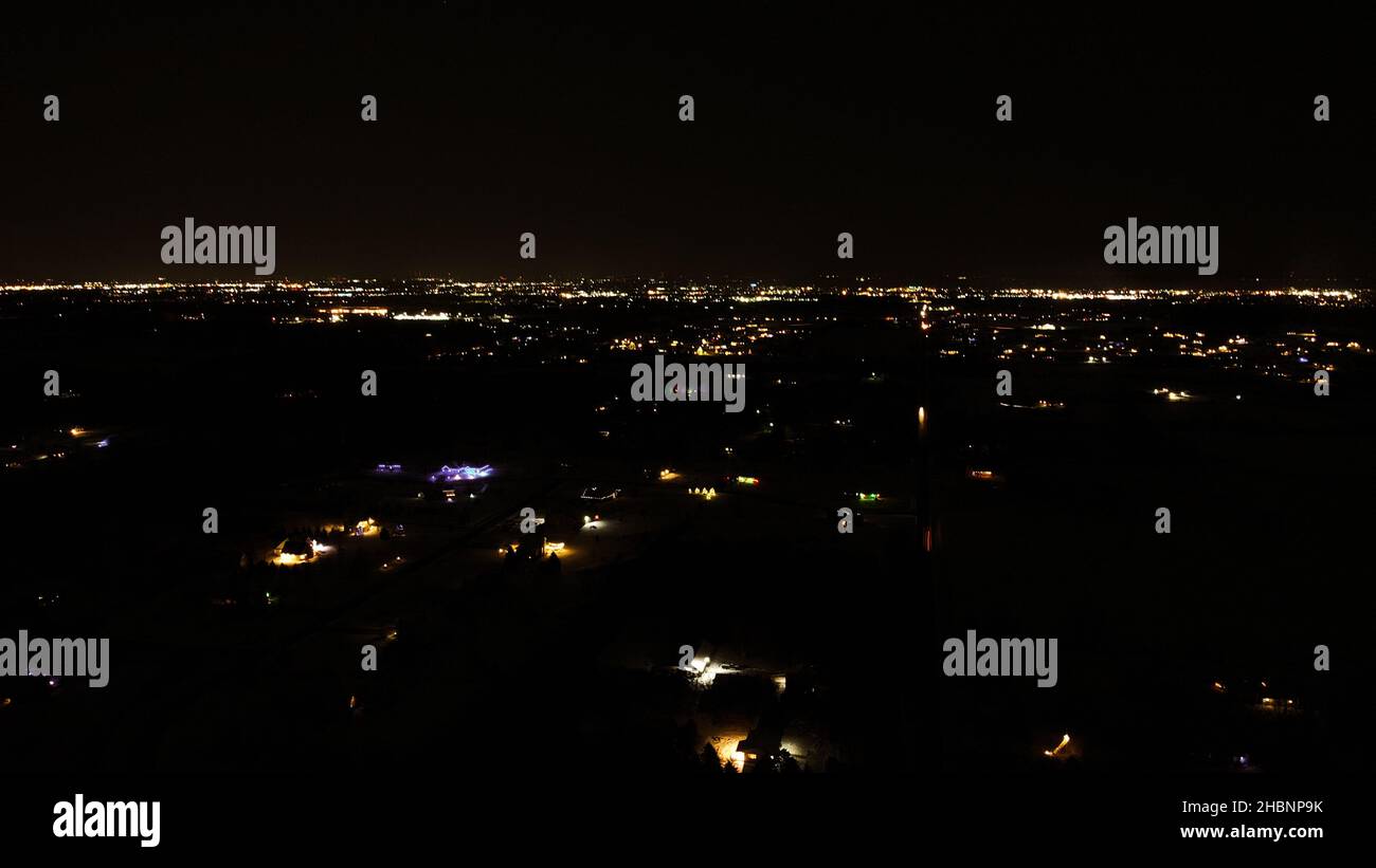 Aerial view as lights come on in rural areas Stock Photo - Alamy