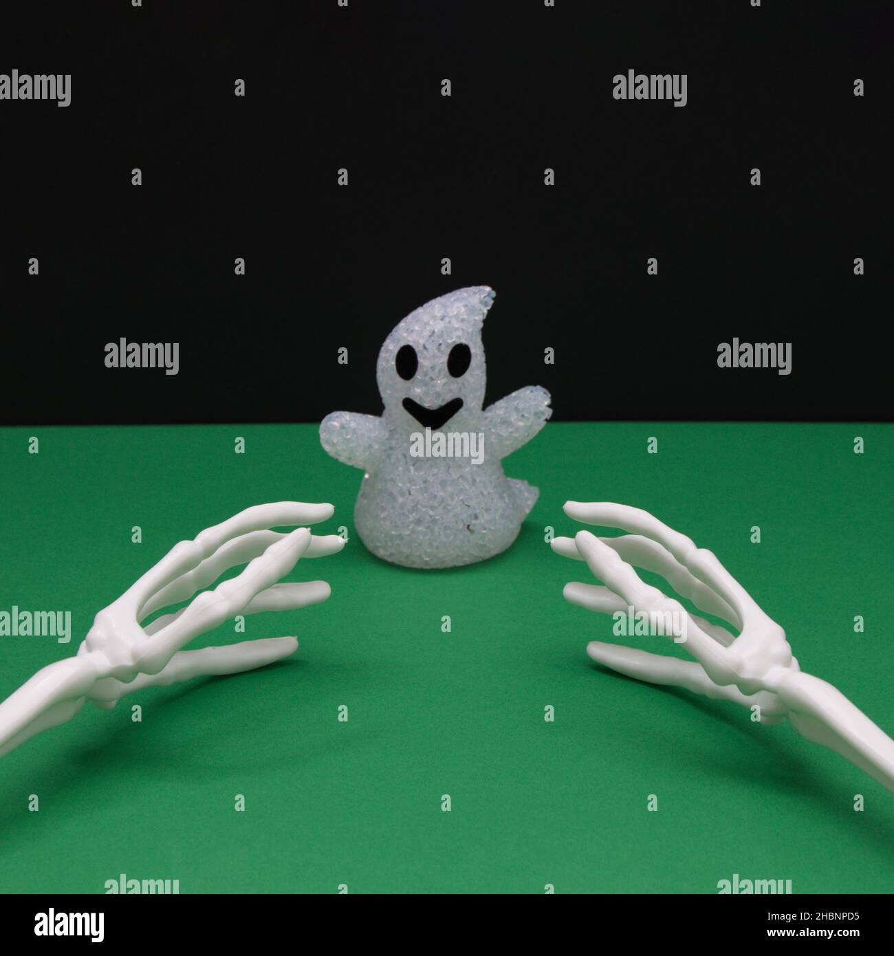 A ghost from Halloween and the bones of the hands that want to catch ...