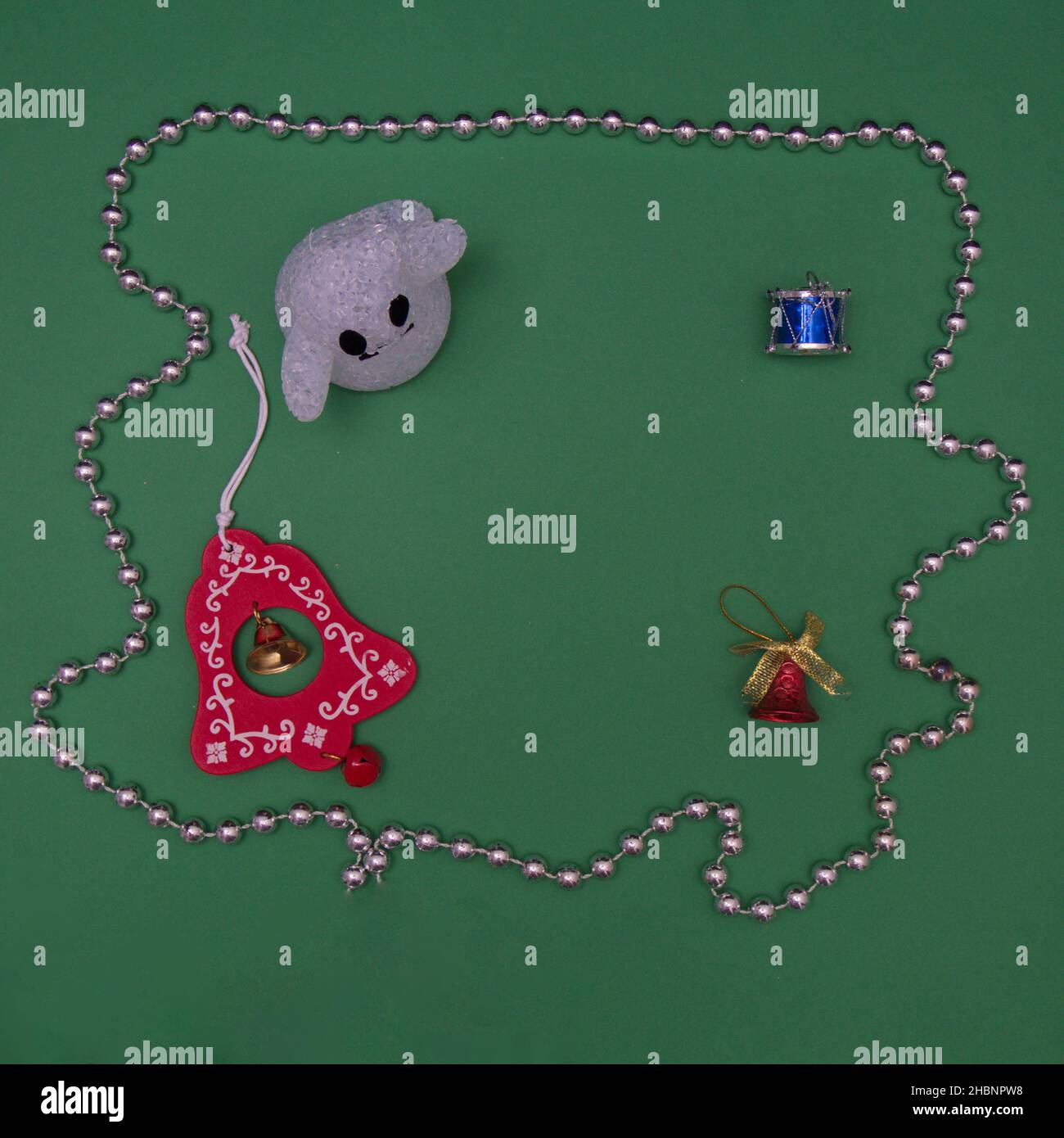 A ghost with Christmas decorations and a silver necklace with copy ...