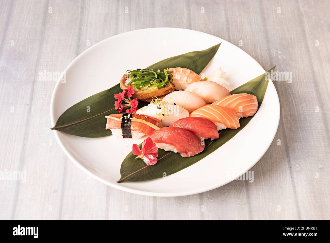 Sushi is a typical dish of Japanese origin based on rice seasoned with ...