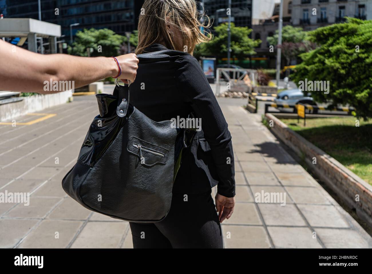 Purse theft hi-res stock photography and images - Alamy