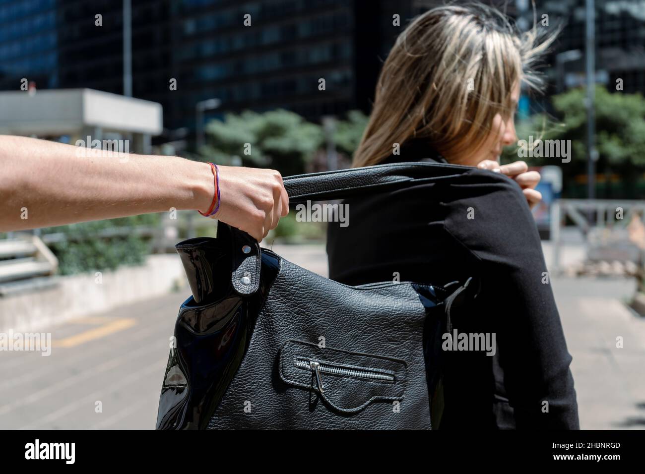 Purse snatch hi-res stock photography and images - Alamy