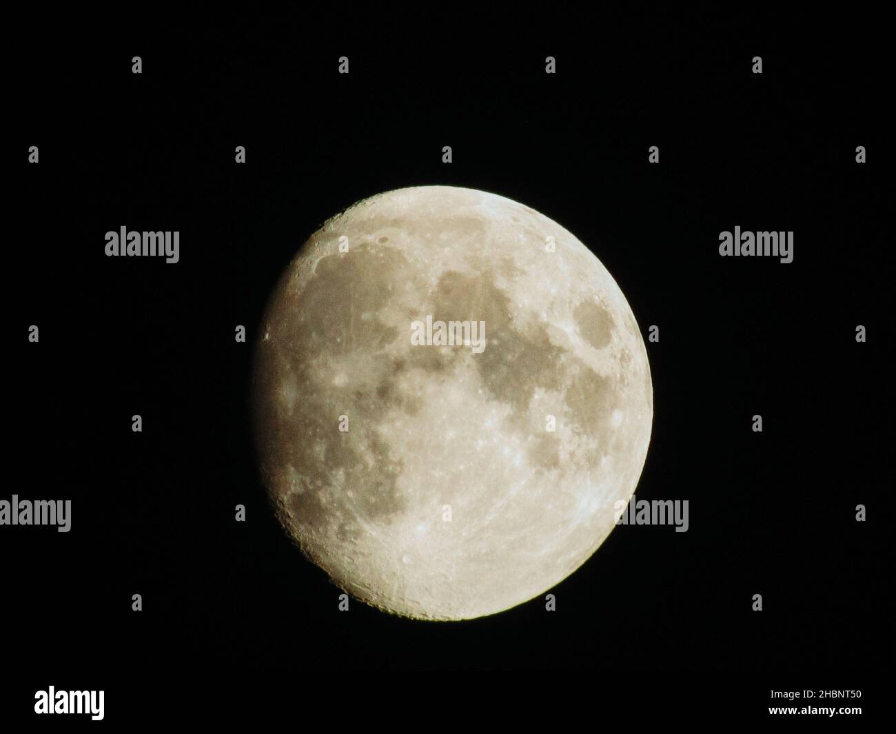 A full moon in the darkness isolated on the black background Stock ...