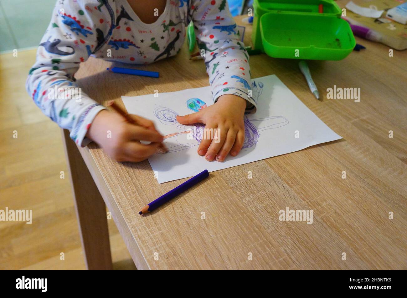 The boy is drawing something hi-res stock photography and images - Alamy