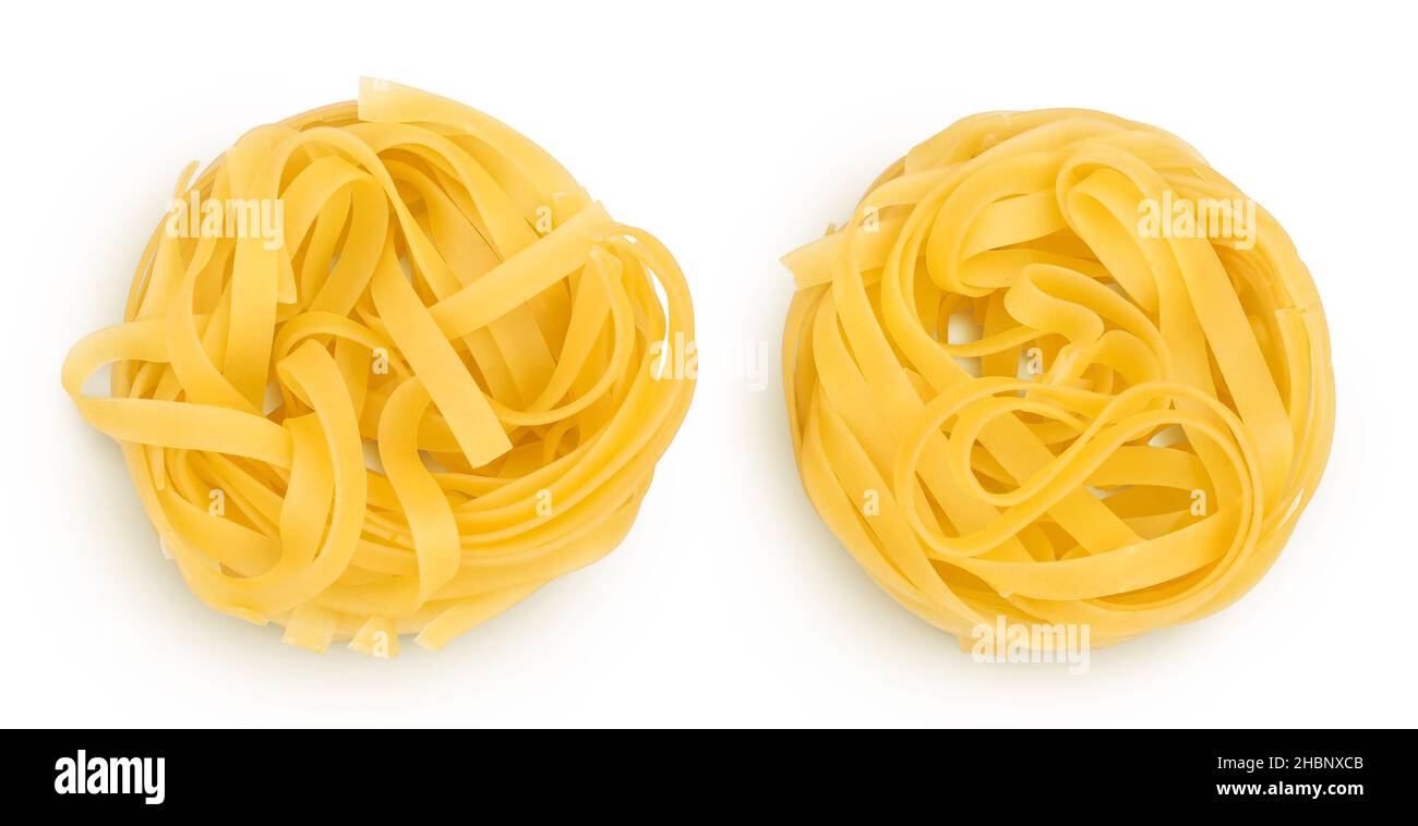 Raw tagliatelle pasta isolated on white background with clipping path ...