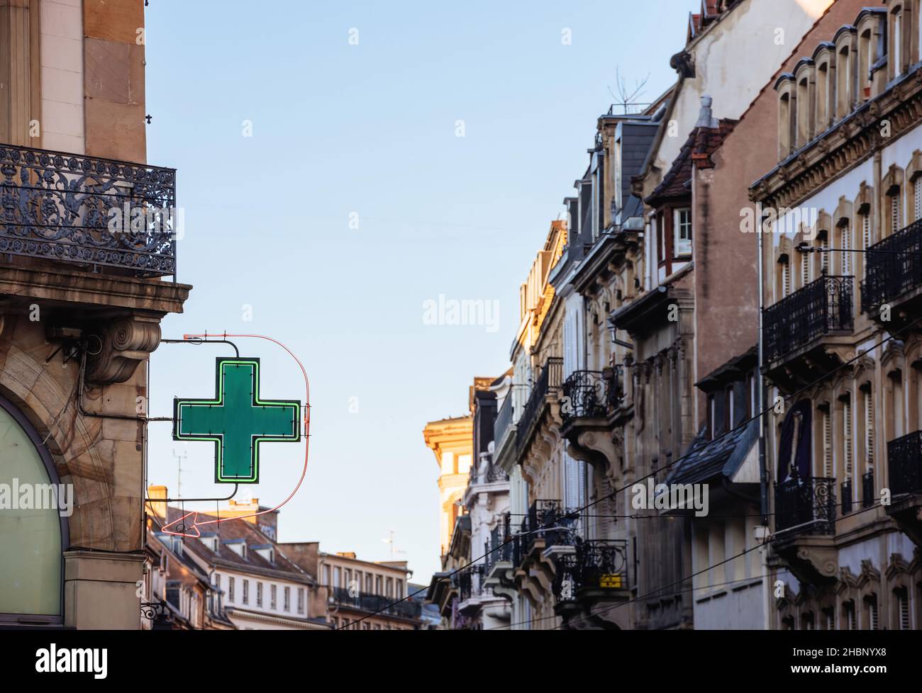 Green pharmacy drug store signage neon sign on the facade of French ...