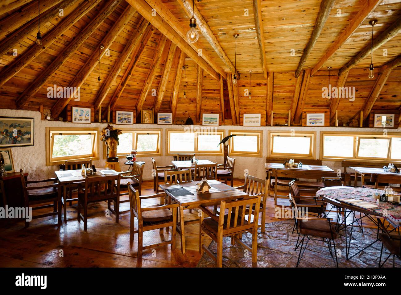 Retro cafe with wooden furniture and wood ceiling Stock Photo - Alamy