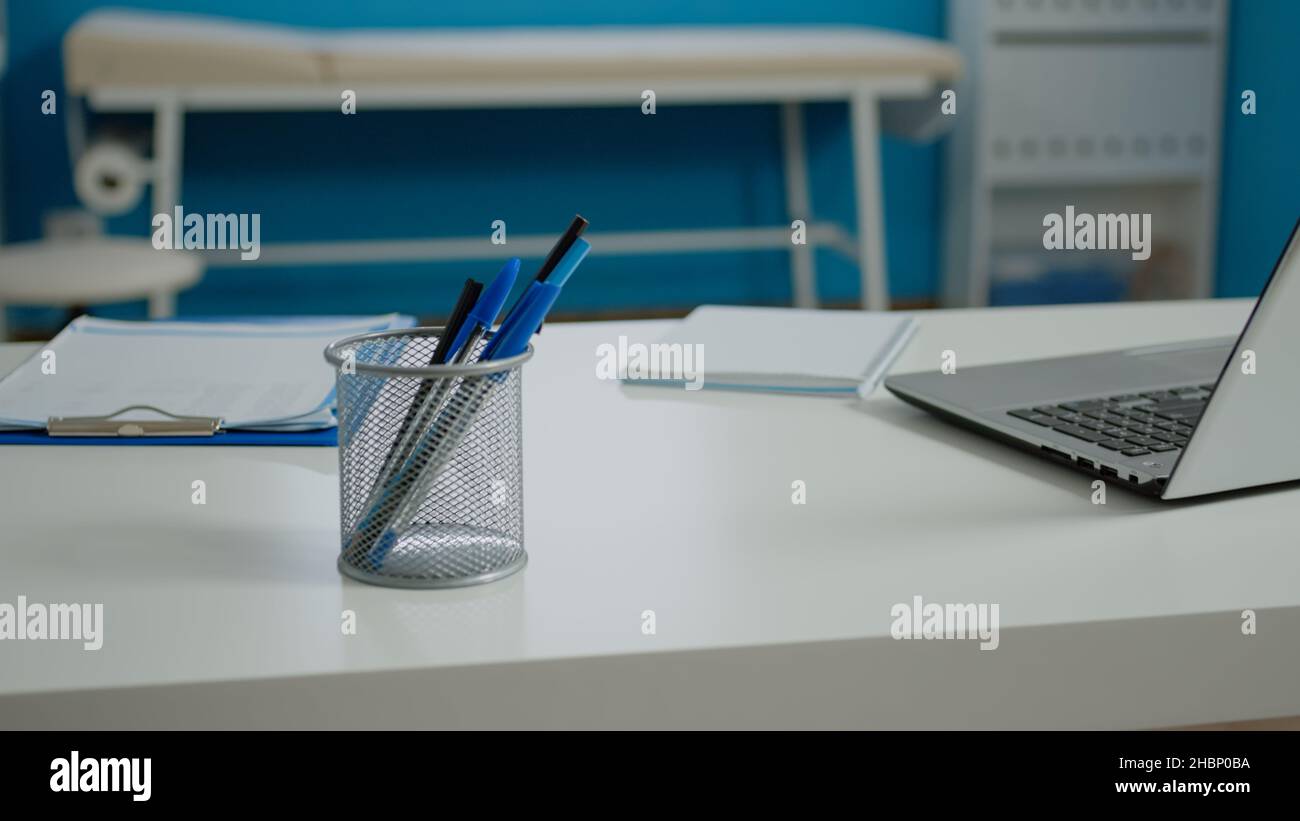Close up of modern desk in empty doctors office at medical clinic with ...