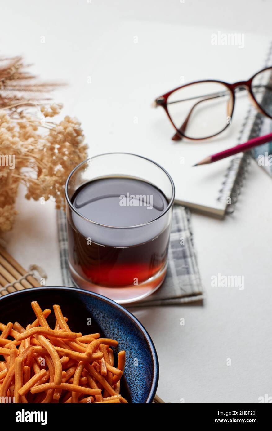 Free time with a cup of coffee and a book Stock Photo - Alamy