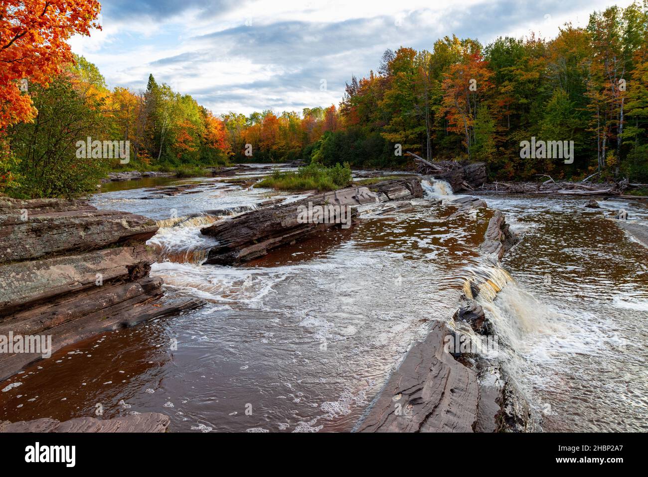 The Bonanza Falls in a forest in autumn in Michigan, the US Stock Photo ...