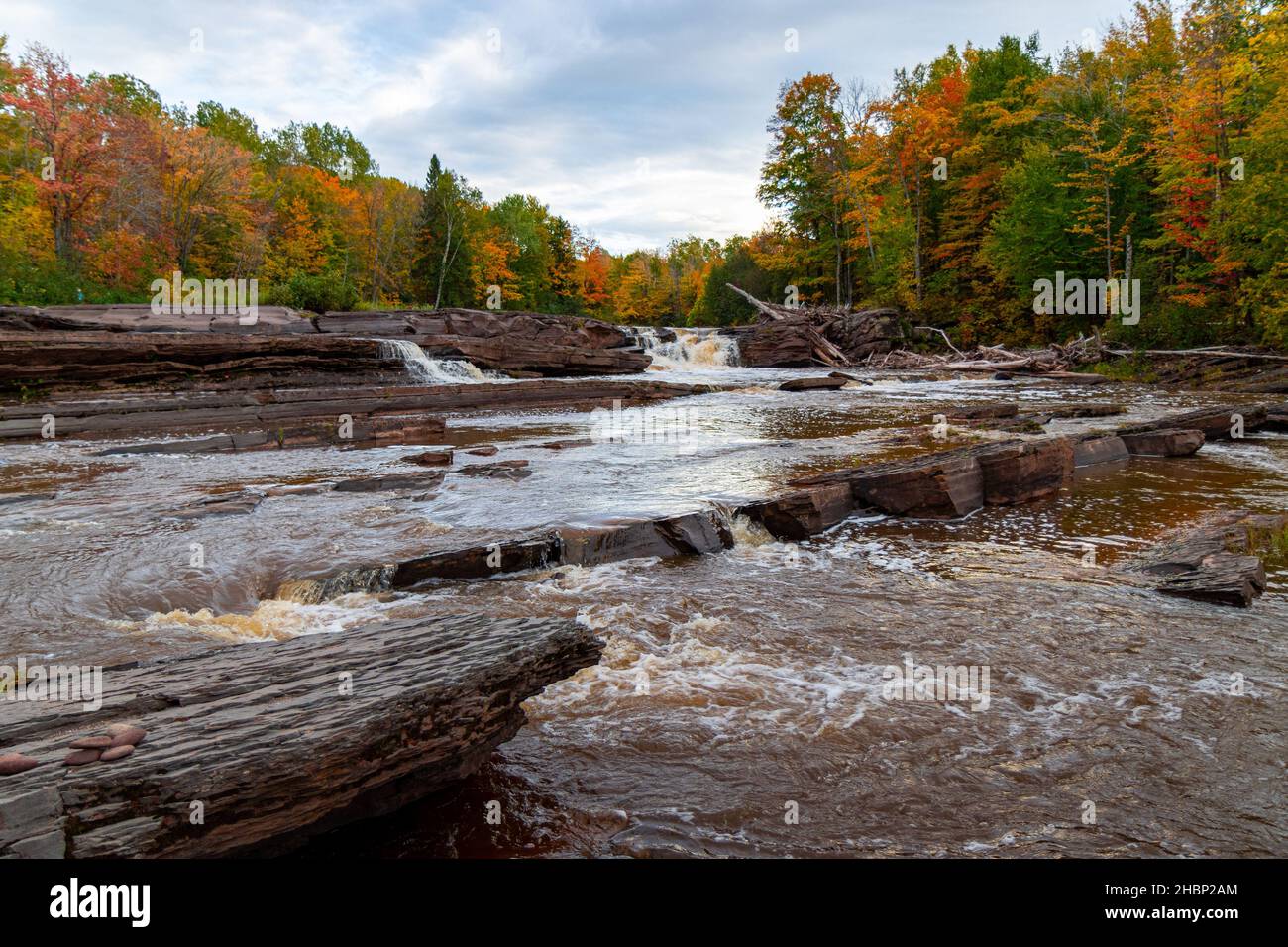 The Bonanza Falls in a forest in autumn in Michigan, the US Stock Photo ...