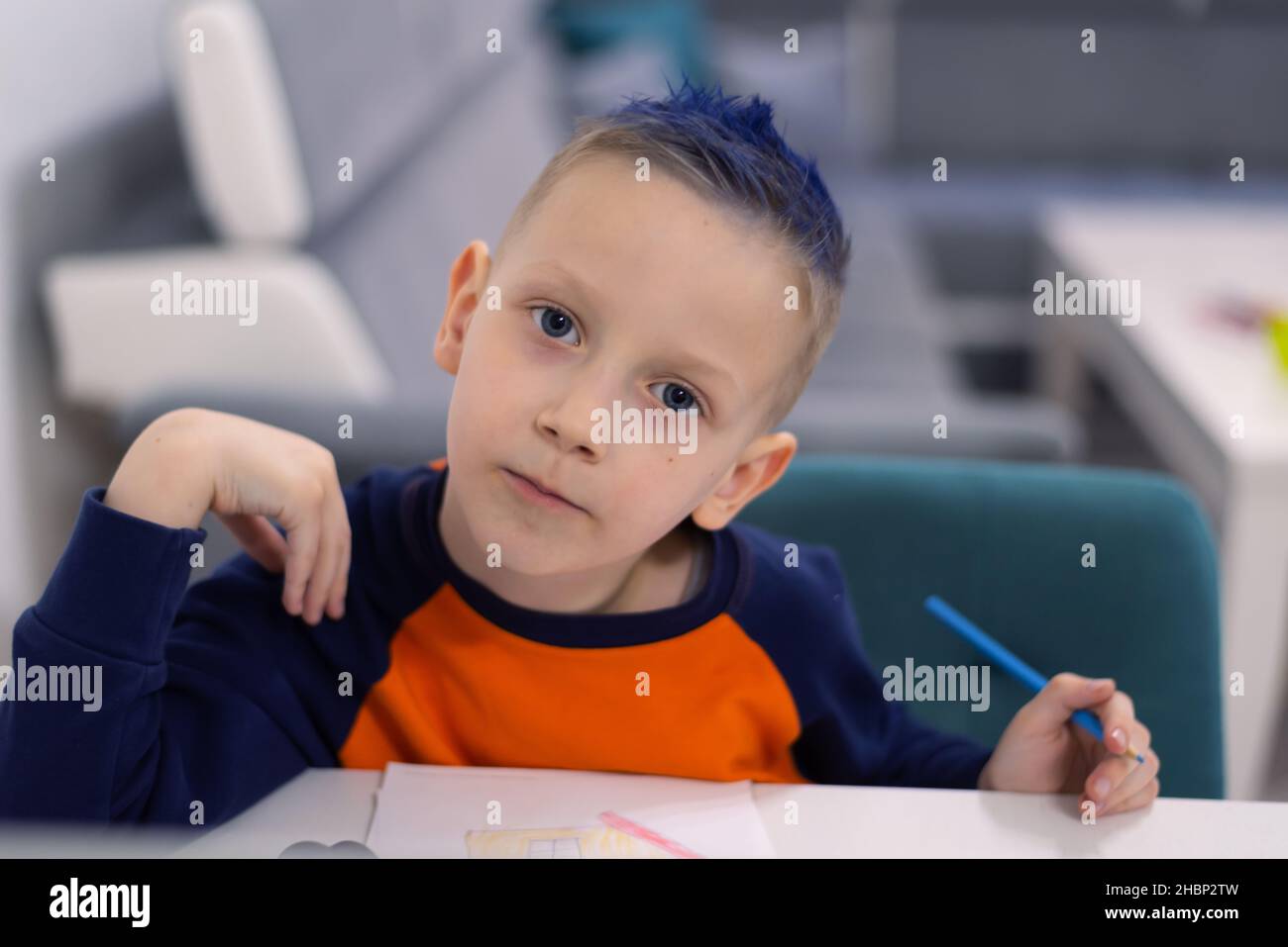 Remote learning concept with boy using laptop. Little boys attending to ...