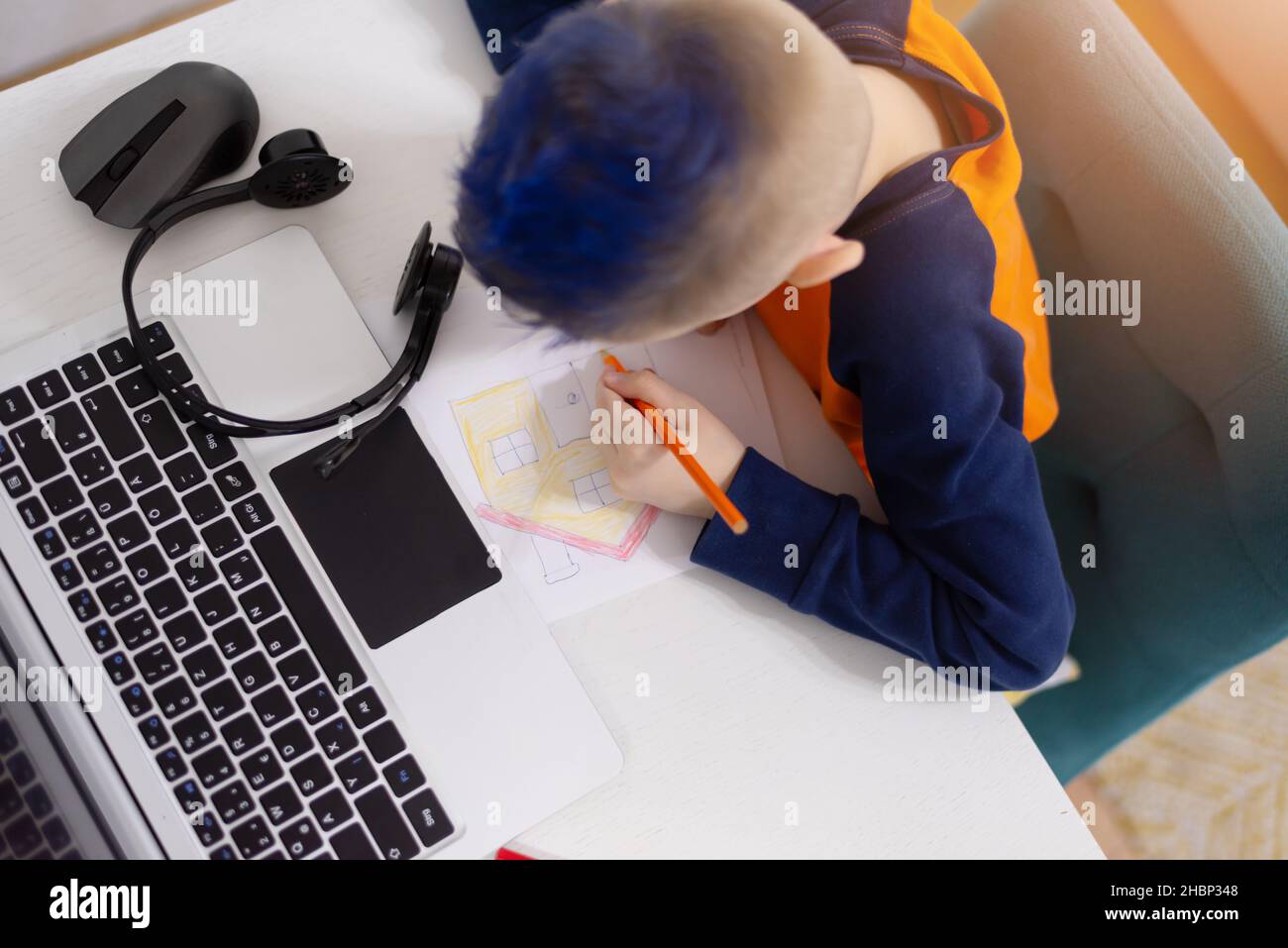 Remote learning concept with boy using laptop. Little boys attending to ...