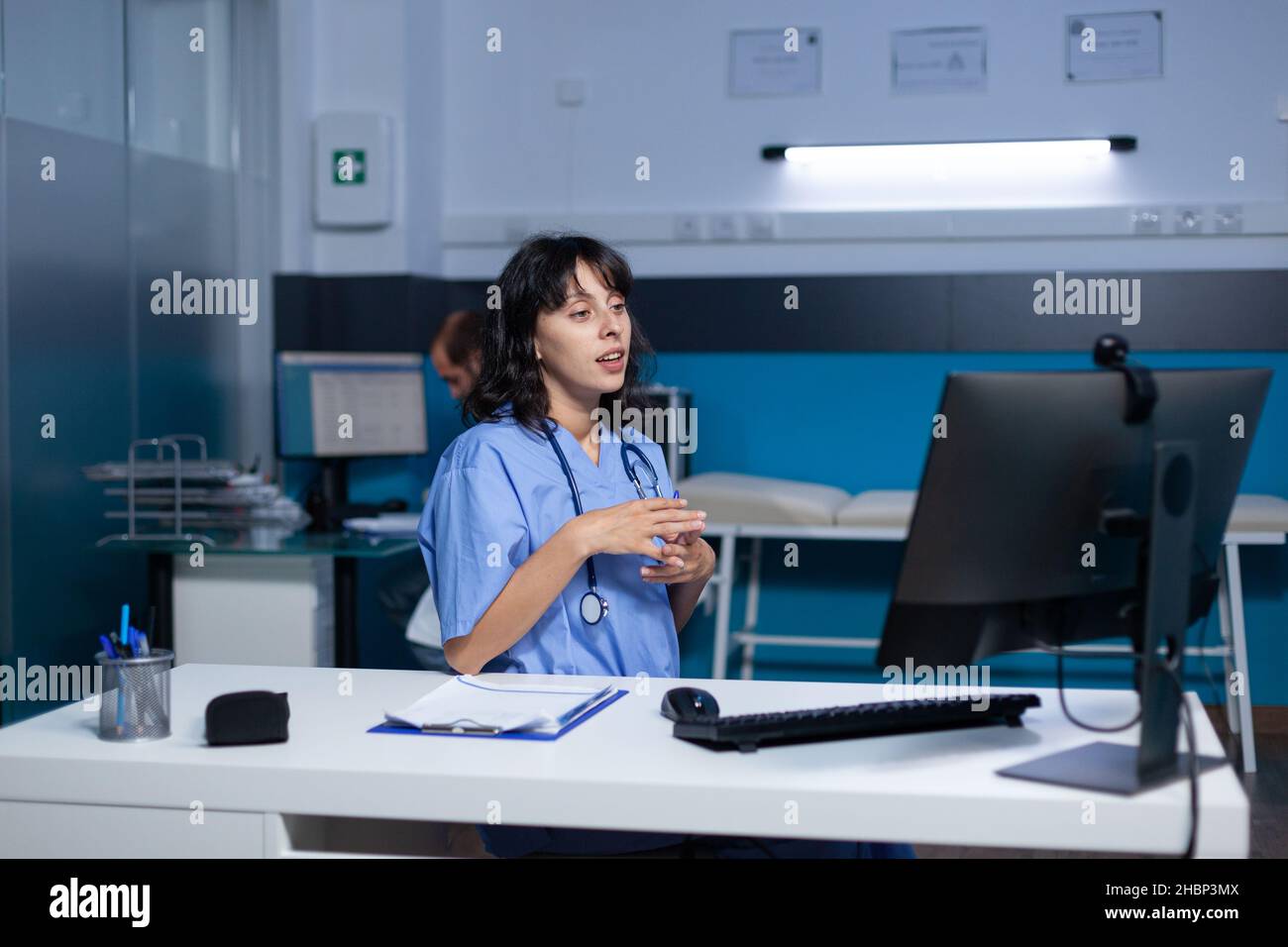Nurse using video call conversation hi-res stock photography and images ...