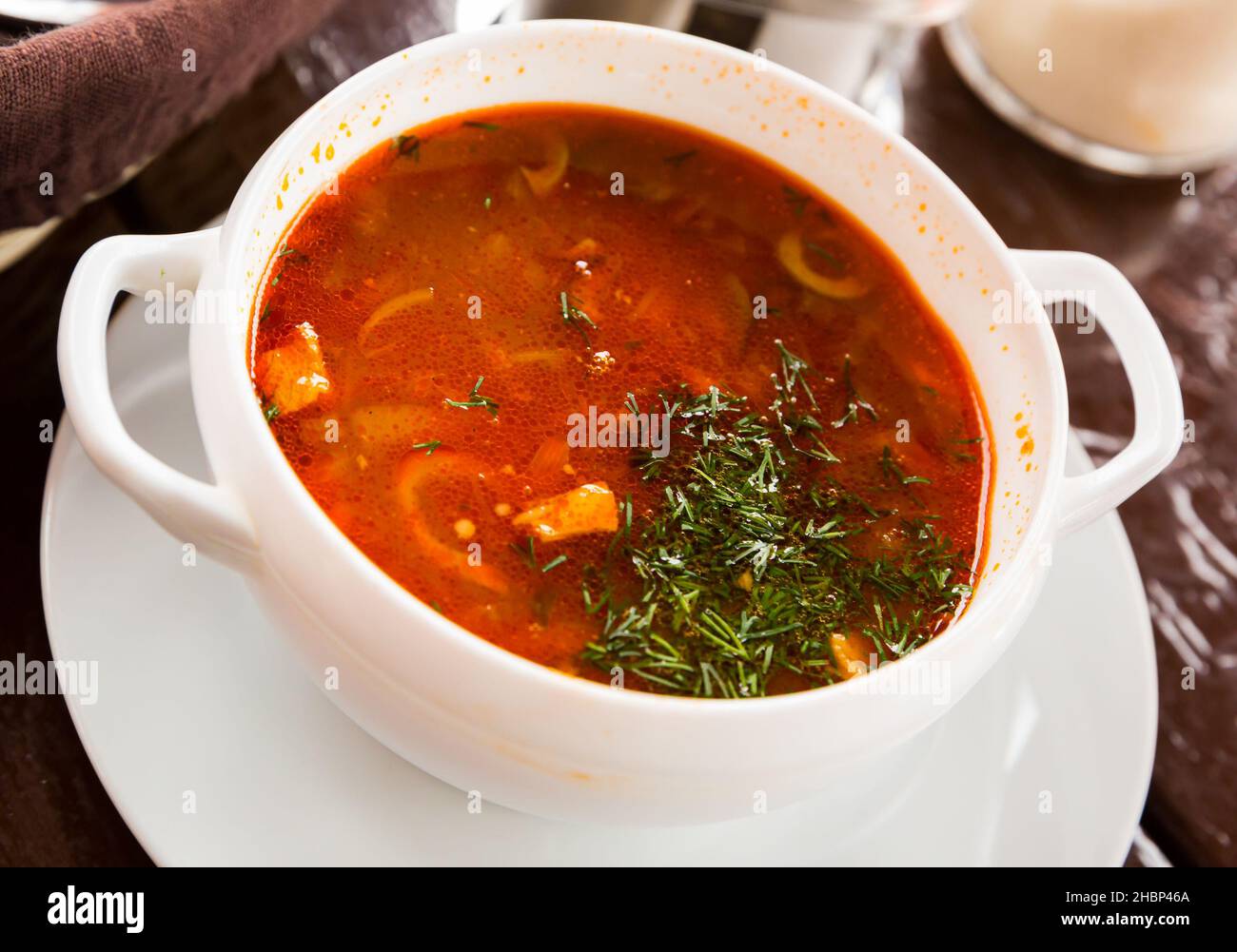 Russian cuisine - solyanka soup with various ingredients Stock Photo ...