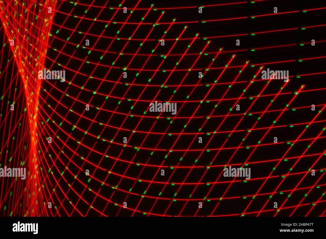 An abstract moving red neon light for techno wallpaper or background ...