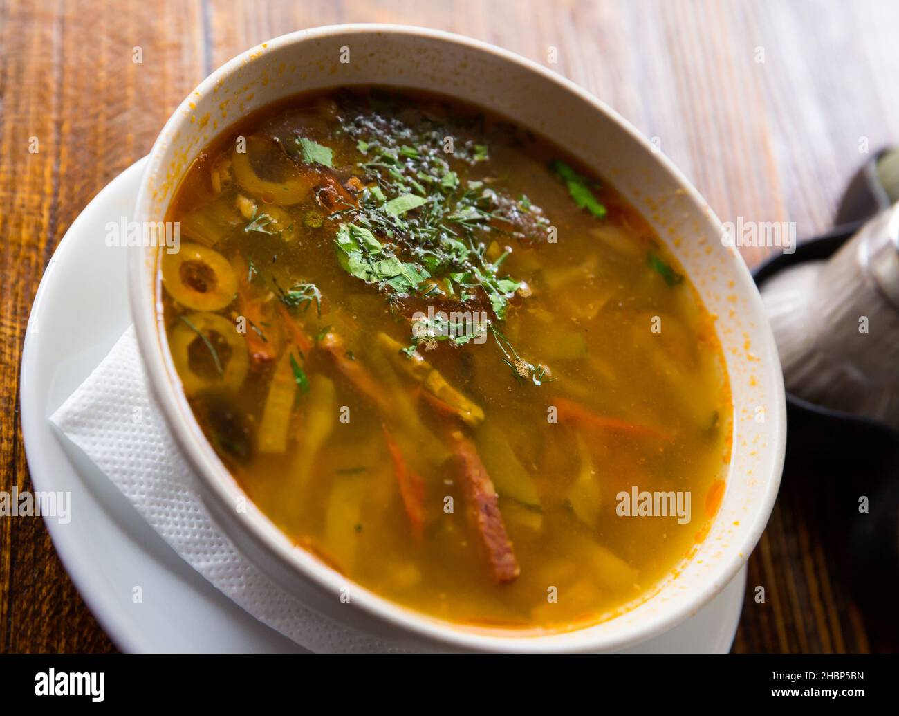 Russian cuisine - solyanka soup with various ingredients Stock Photo ...