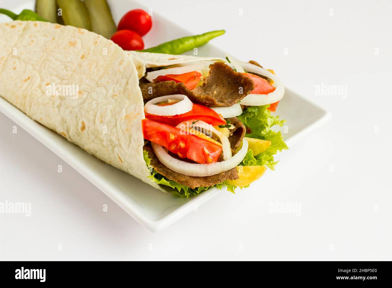 Traditional Turkish kebab,doner wrapped with flat bread,lavas and ...