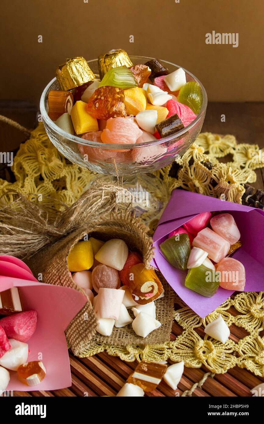 Colorful,Traditional Turkish hard candy is Akide in wooden tray with ...