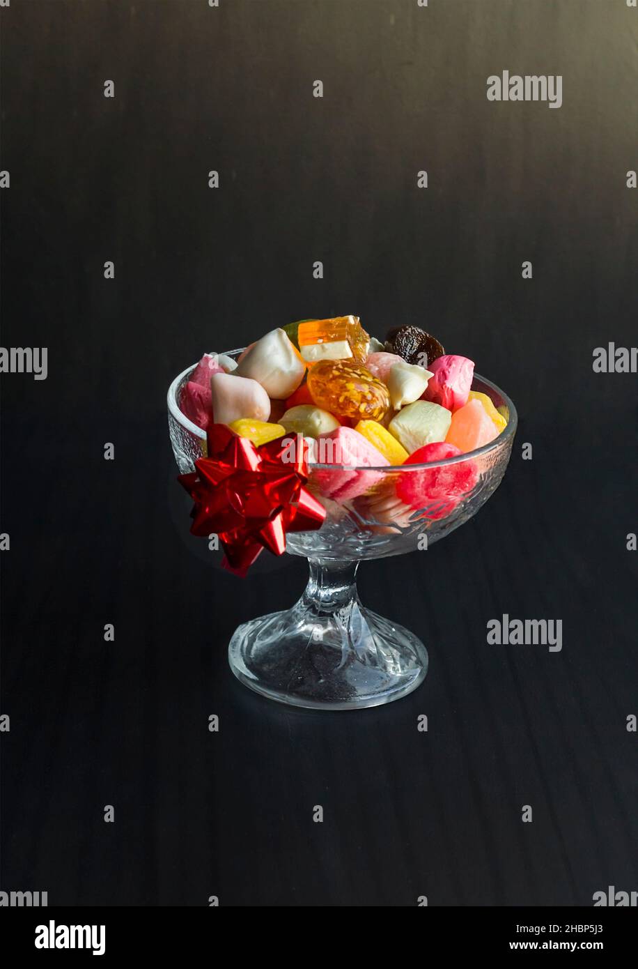Traditional Turkish hard candy,Akide in glass candy bowl with red ...